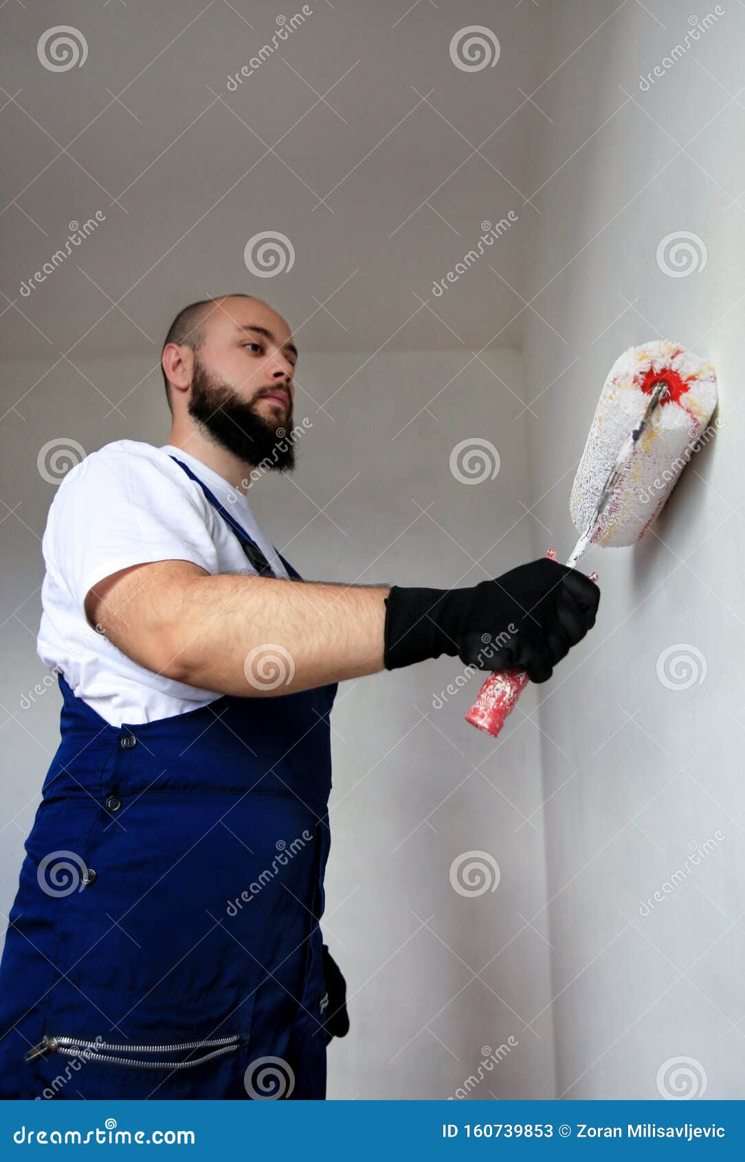 Construction Worker Doing Finish Renovation at Apartment. Professional ...