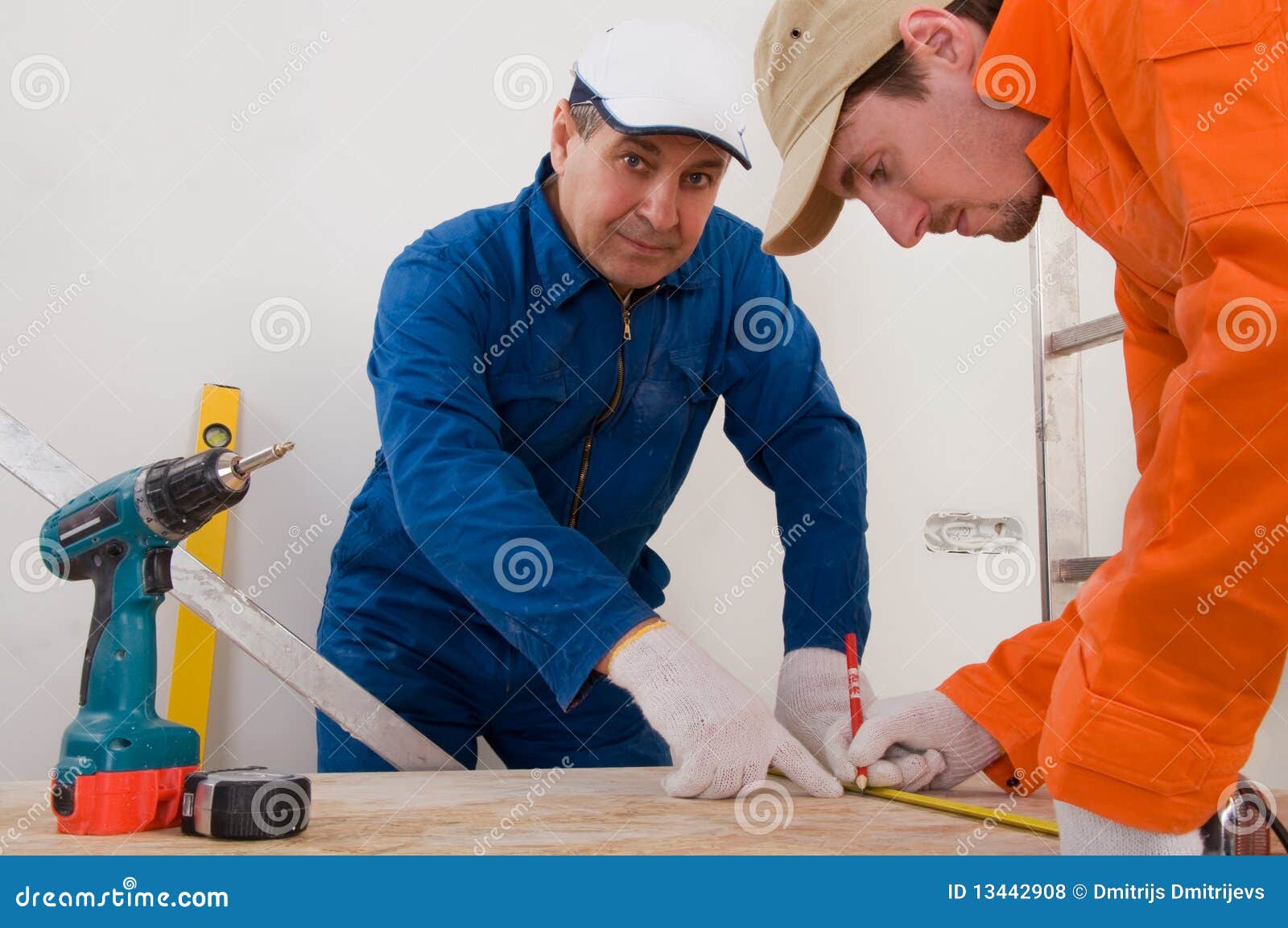 Construction Worker Doing Measuring Stock Photo - Image of line ...