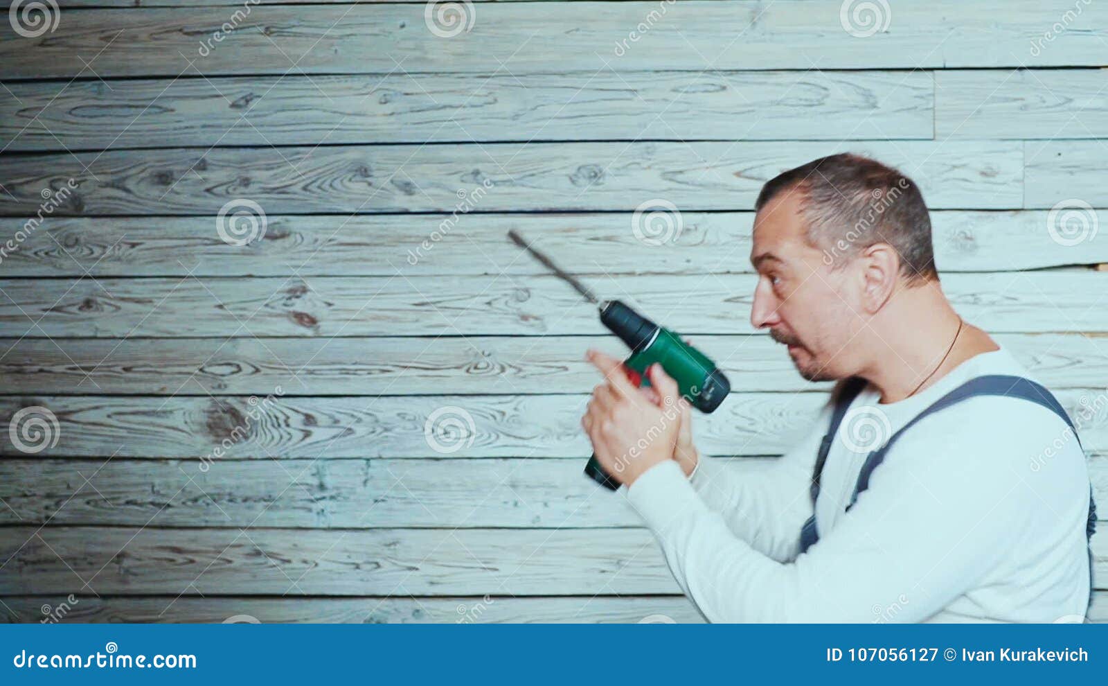 Happy Construction Worker with a Drill in His Hand Dancing Fun Stock ...