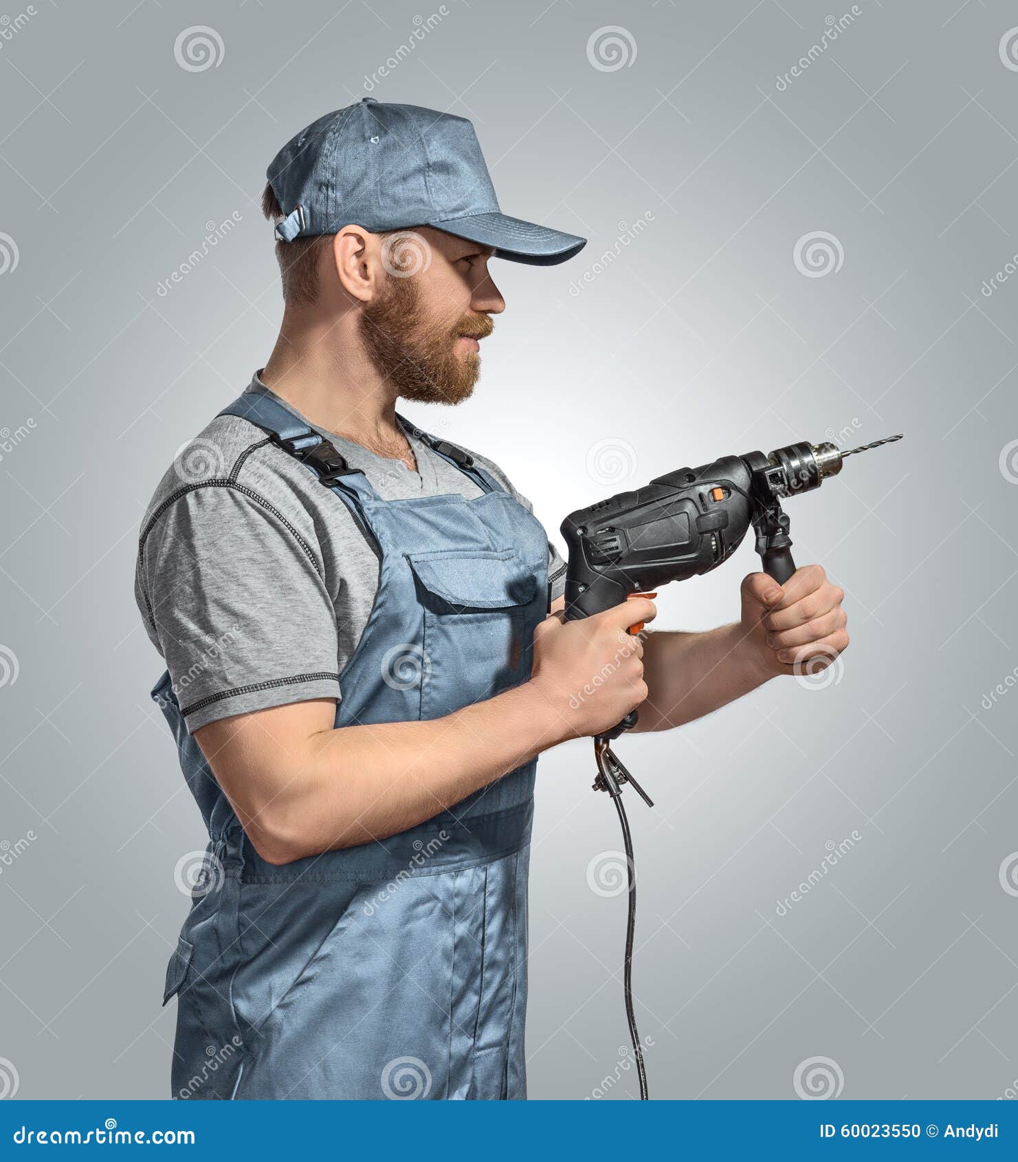 Construction Worker with Drill on the Isolated Background Stock Photo ...