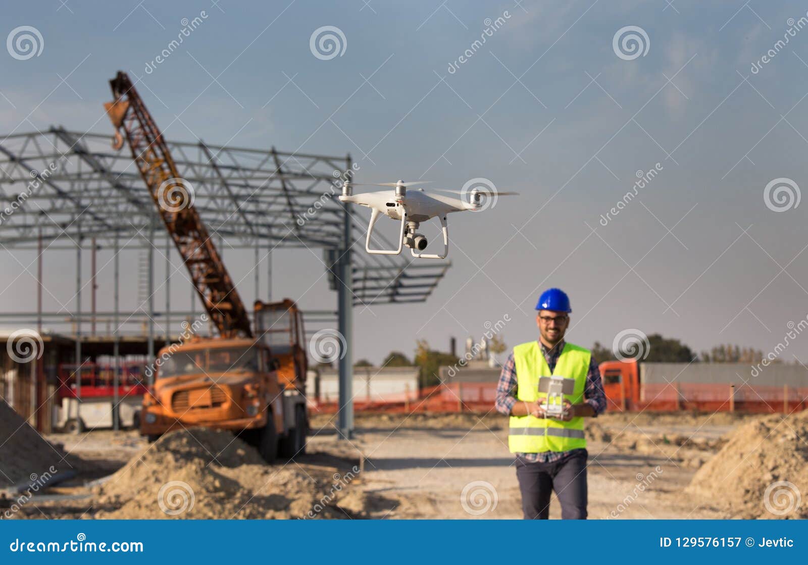 Construction Worker with Drone at Building Site Stock Image - Image of ...