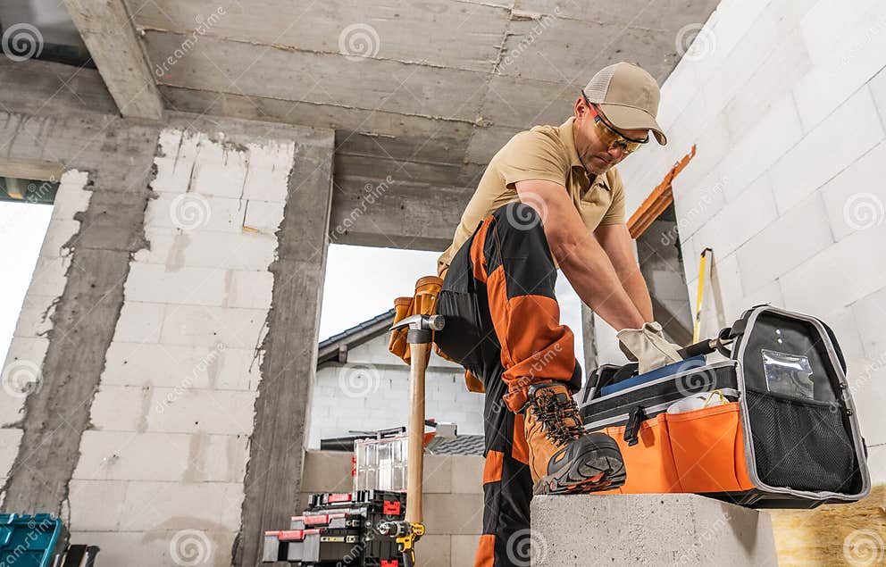 Construction Worker Engaged in Building Project Stock Photo - Image of ...