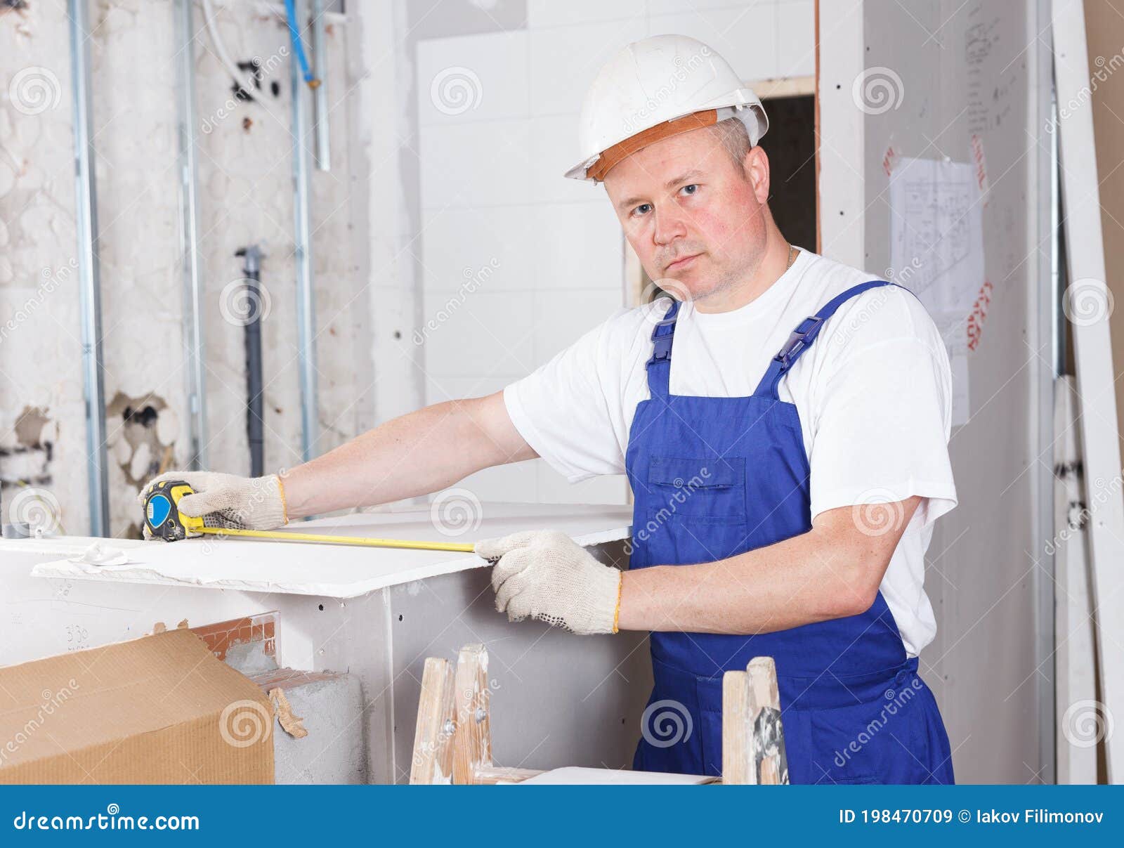 Worker Engaged in Drywall Mounting Stock Image - Image of clothing ...