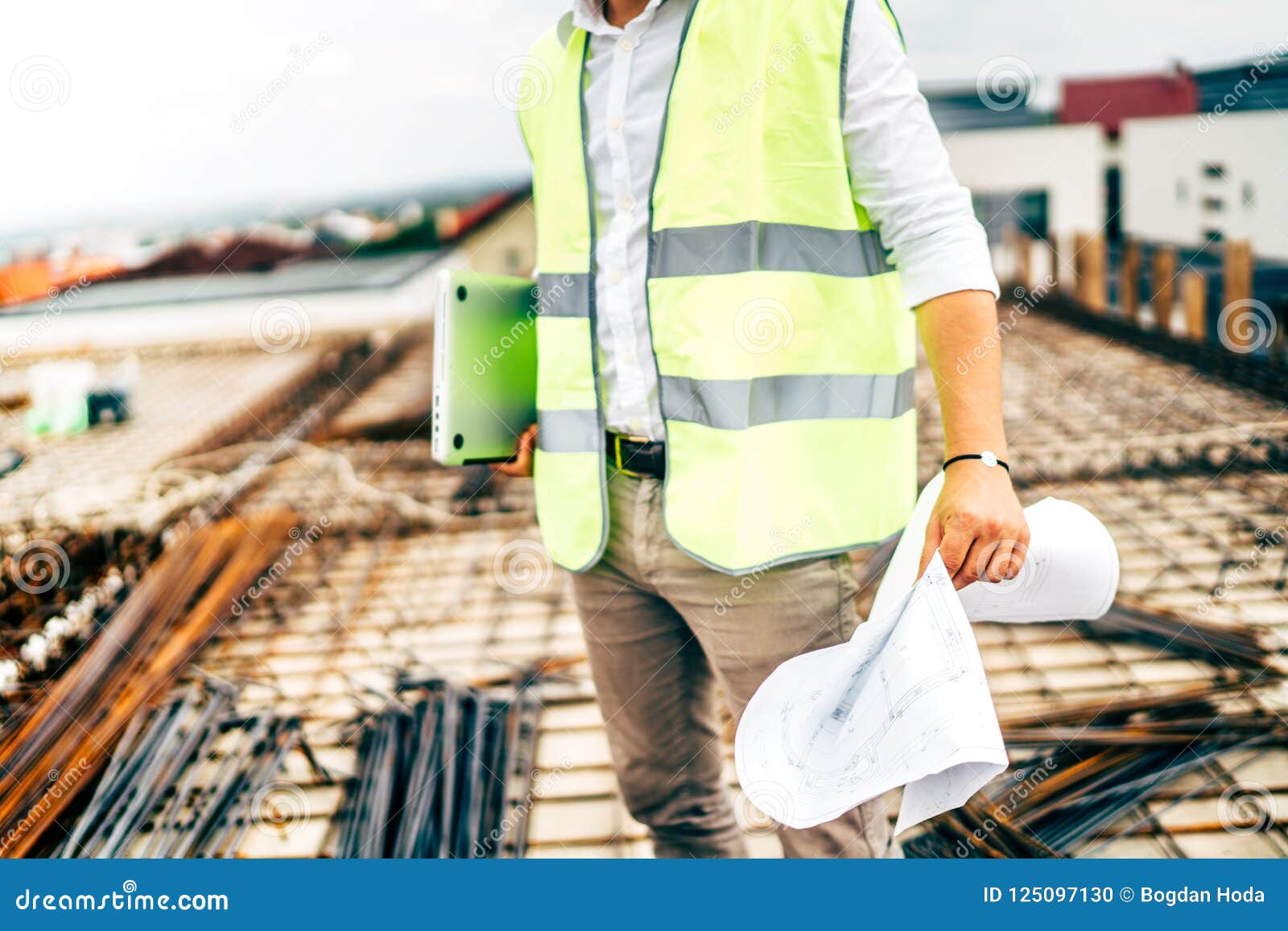 Construction Worker, Engineer Wearing Safety Vest and Laptop on ...