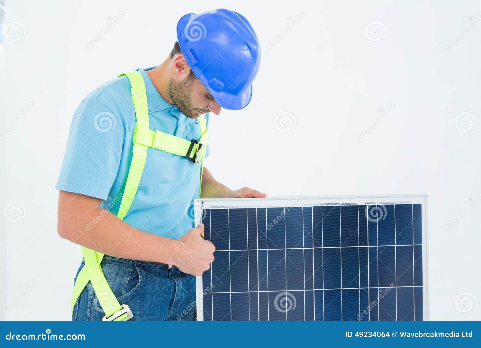 Construction Worker Examining Solar Panel Stock Photo - Image of person ...