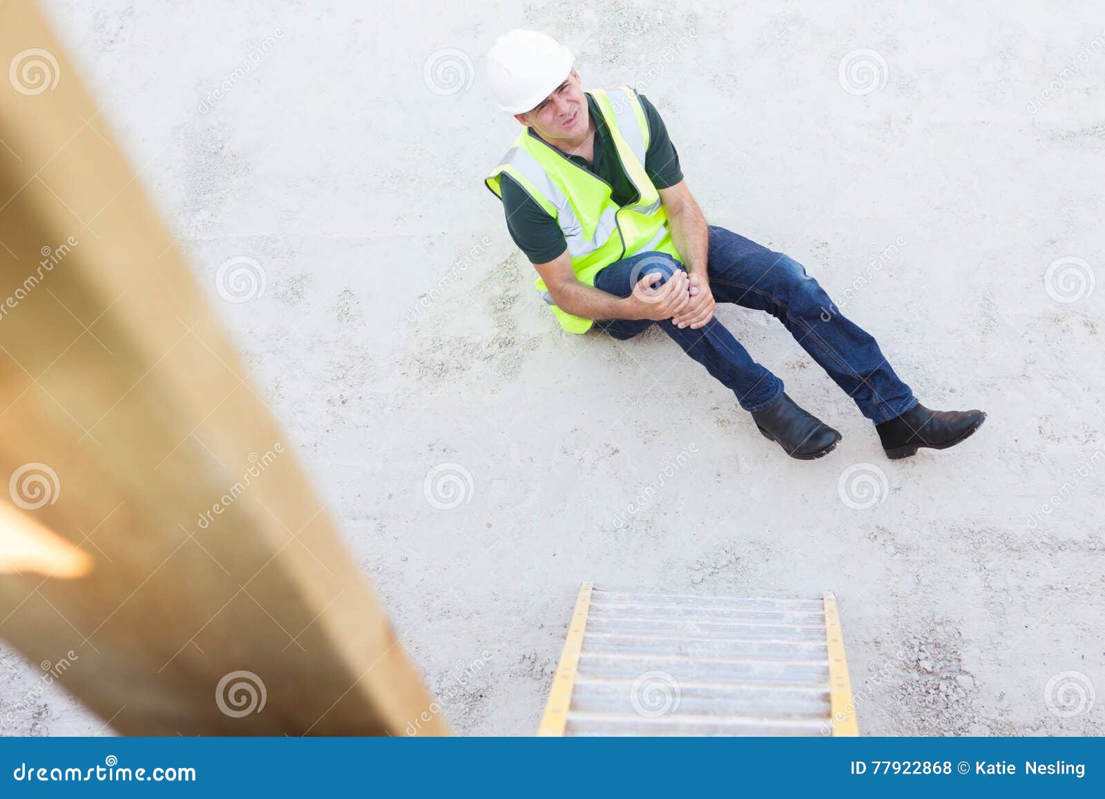 Construction Worker Falling Off Ladder and Injuring Leg Stock Photo ...