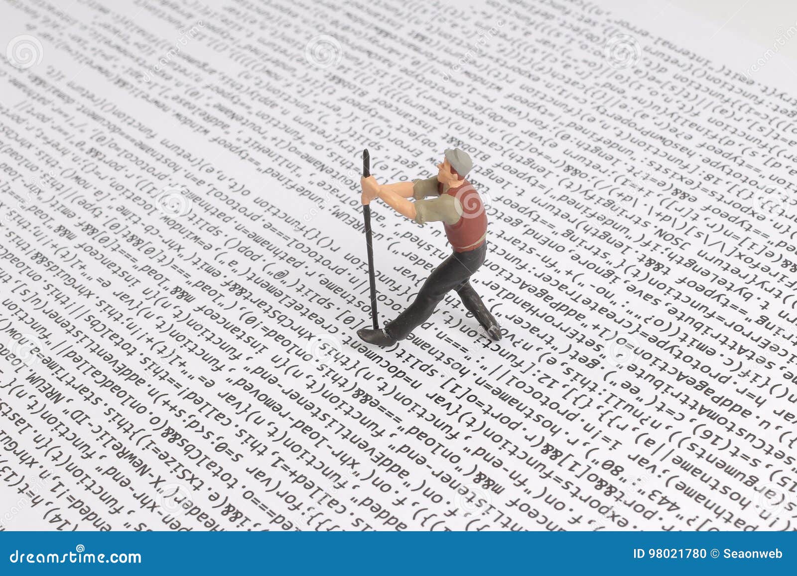 Construction Worker Figurines Working on the Code. Stock Photo - Image ...