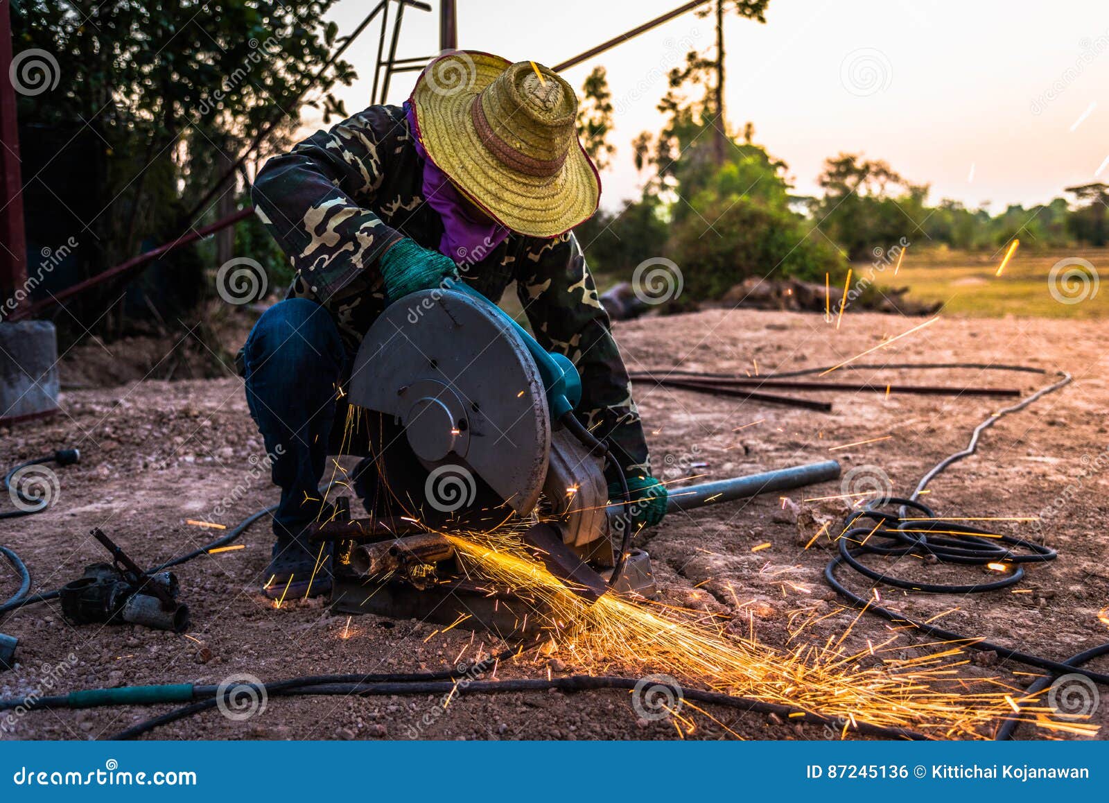 Construction Worker and Fire from Builders in the Evening. Stock Photo ...