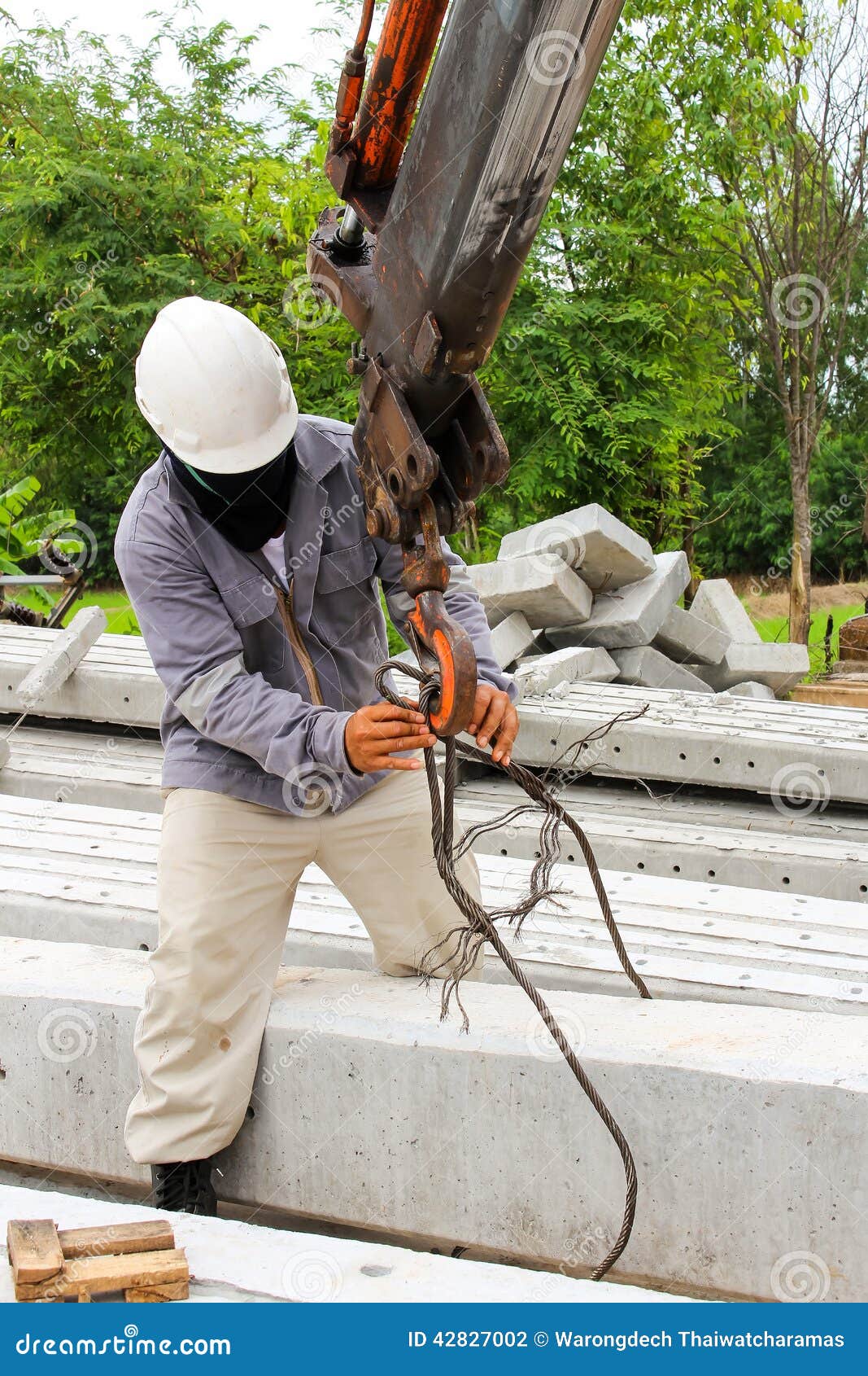 Construction Worker Fitting Crane Hook on Pole Stock Photo - Image of ...