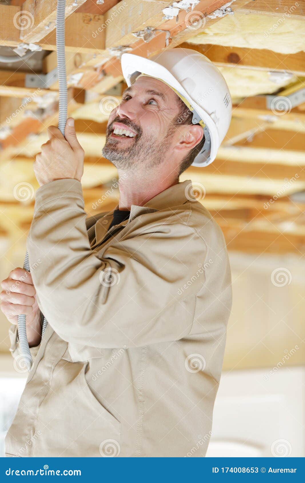 Construction Worker Fixing Cable in Ceiling Stock Image - Image of ...