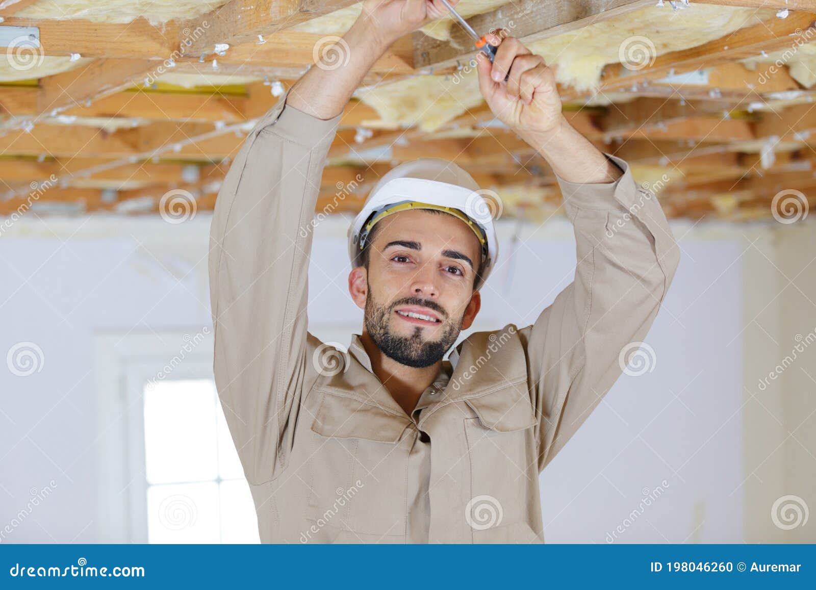 Construction Worker Fixing Ceiling Stock Photo - Image of professional ...