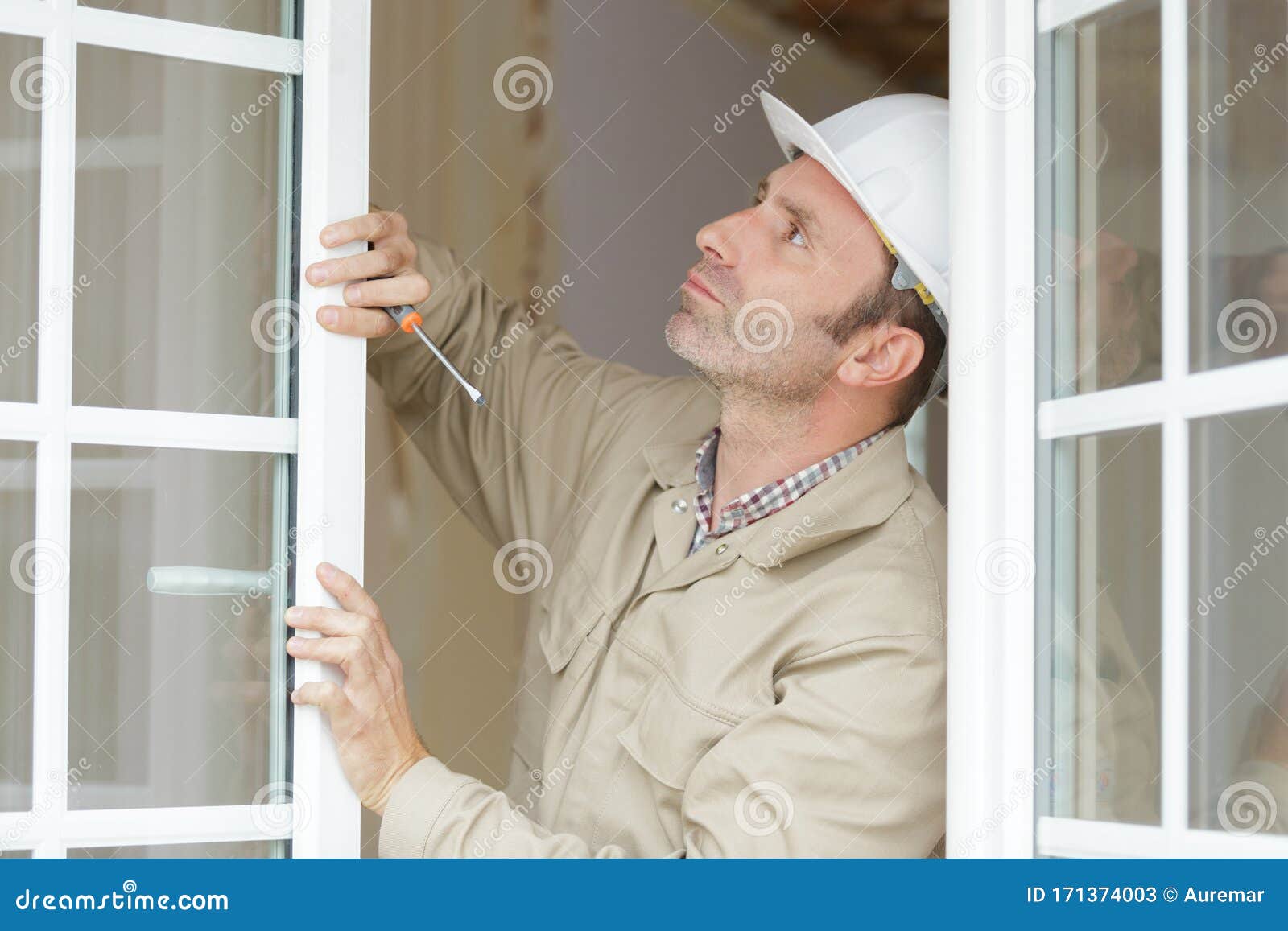 Construction Worker Fixing Window Stock Image - Image of manual ...