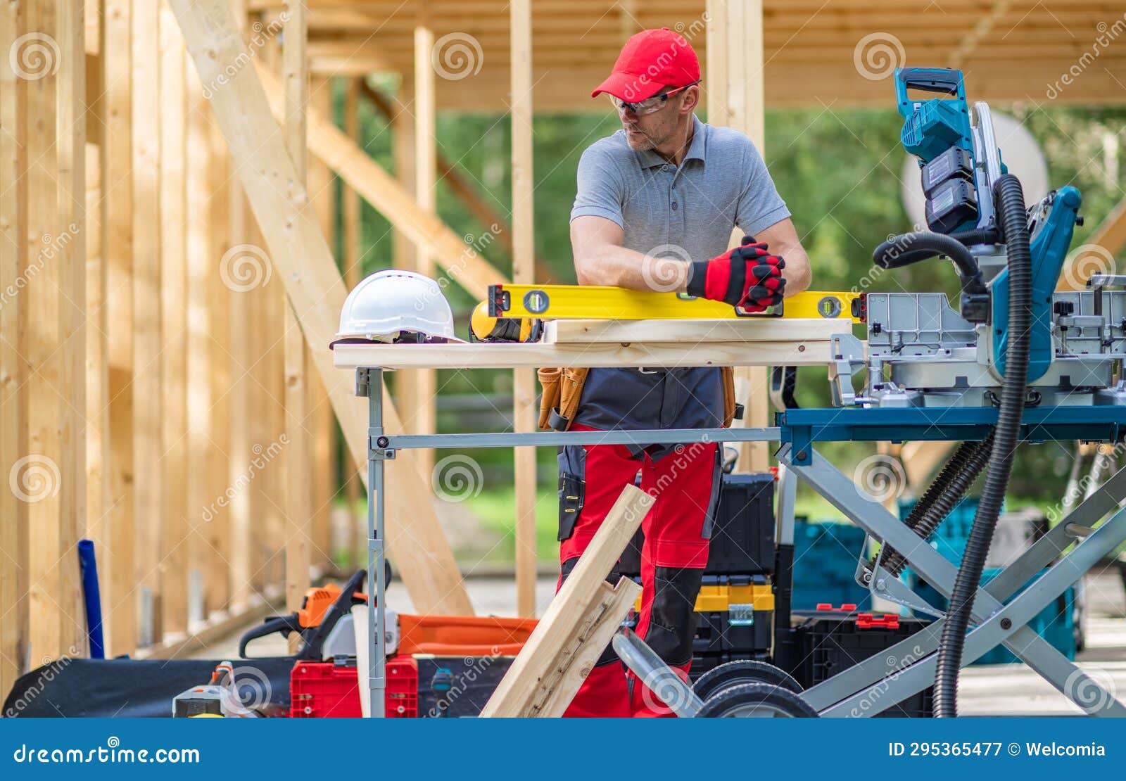 Construction Worker in Front of Newly Developed Wooden Made House Stock ...