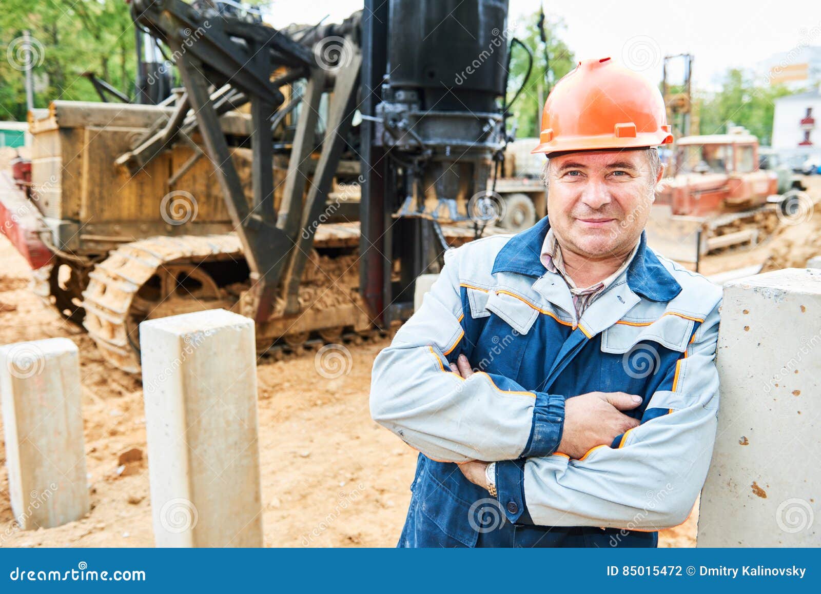 Construction Worker in Front of Pile Driver Machine Stock Photo - Image ...
