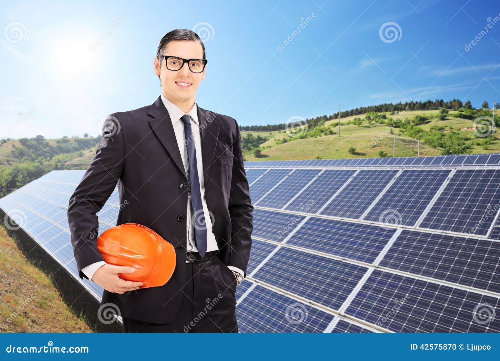 Construction Worker in Front of Solar Panels Stock Photo - Image of ...
