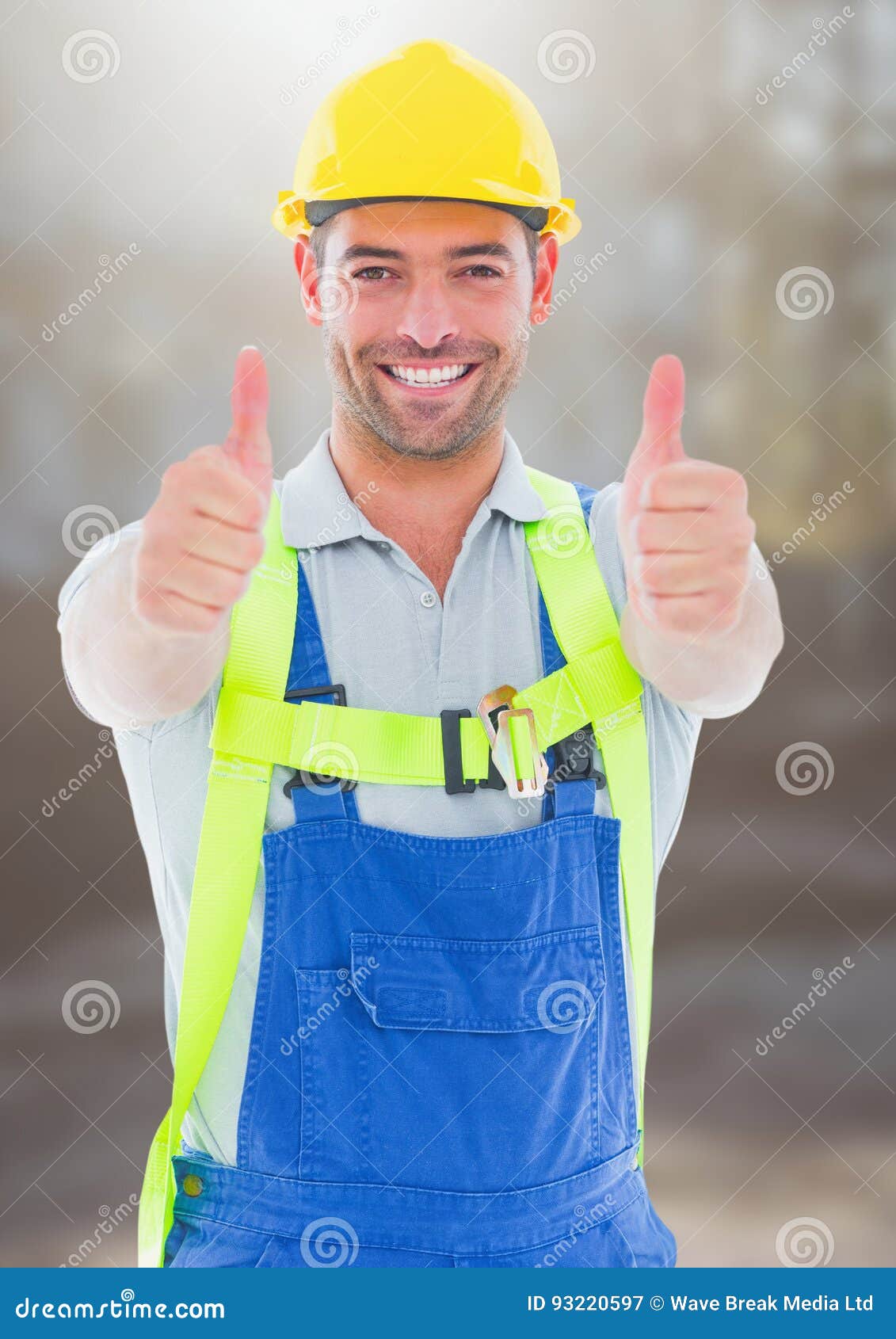 Construction Worker Giving Thumbs Up in Front of Construction Site ...