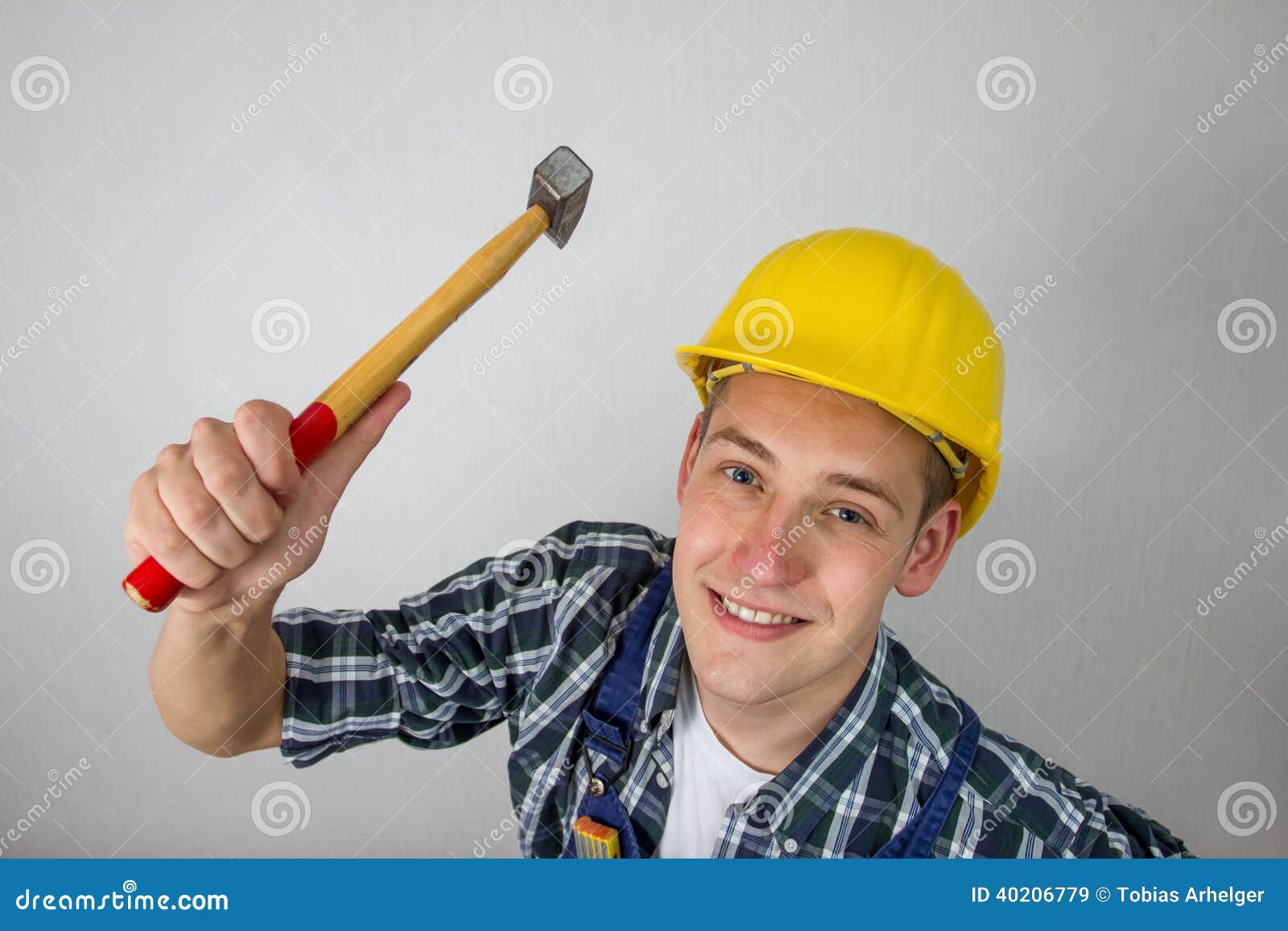 Construction Worker with a Hammer Stock Image - Image of machines ...