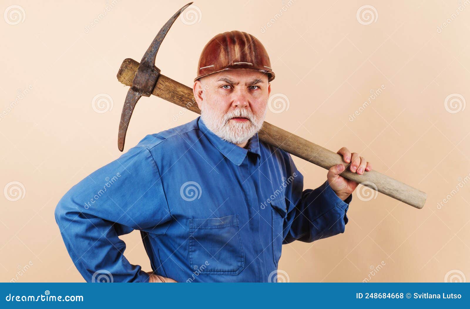 Construction Worker in Hard Hat and Uniform with Pickaxe. Male Laborer ...