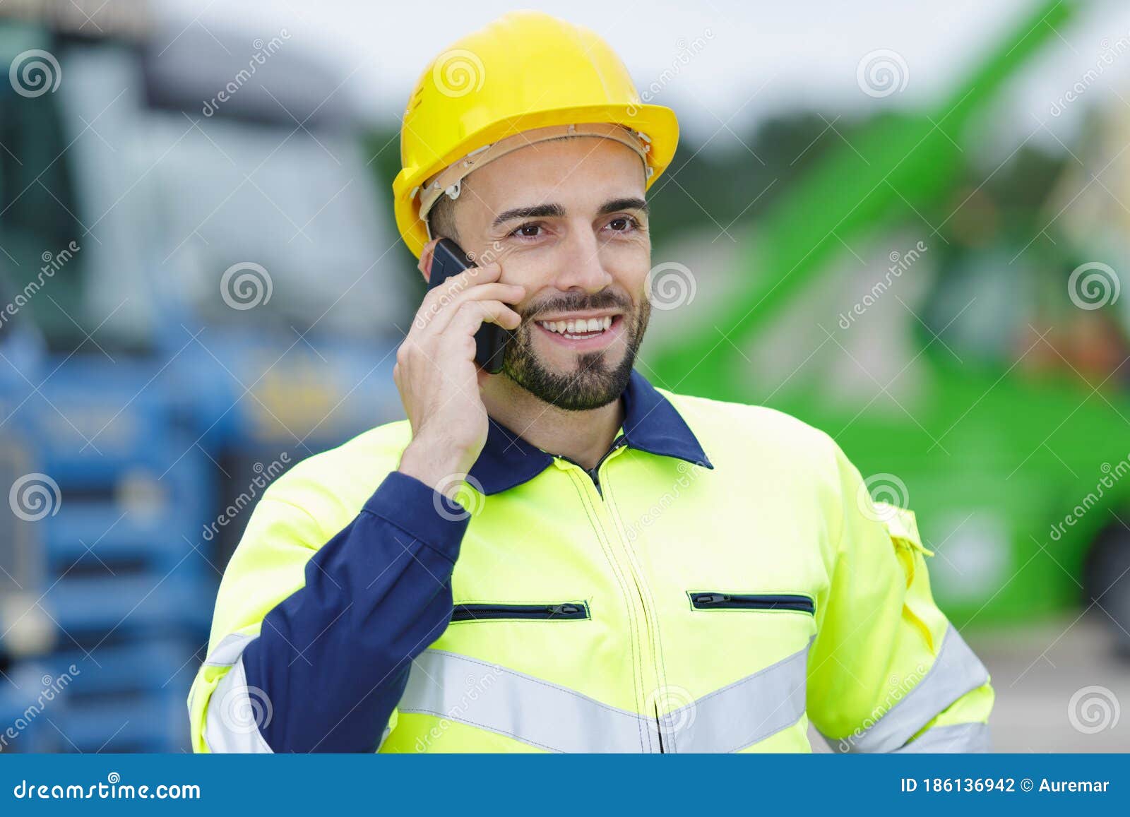 Construction Worker Having Conversation on Phone Stock Photo - Image of ...