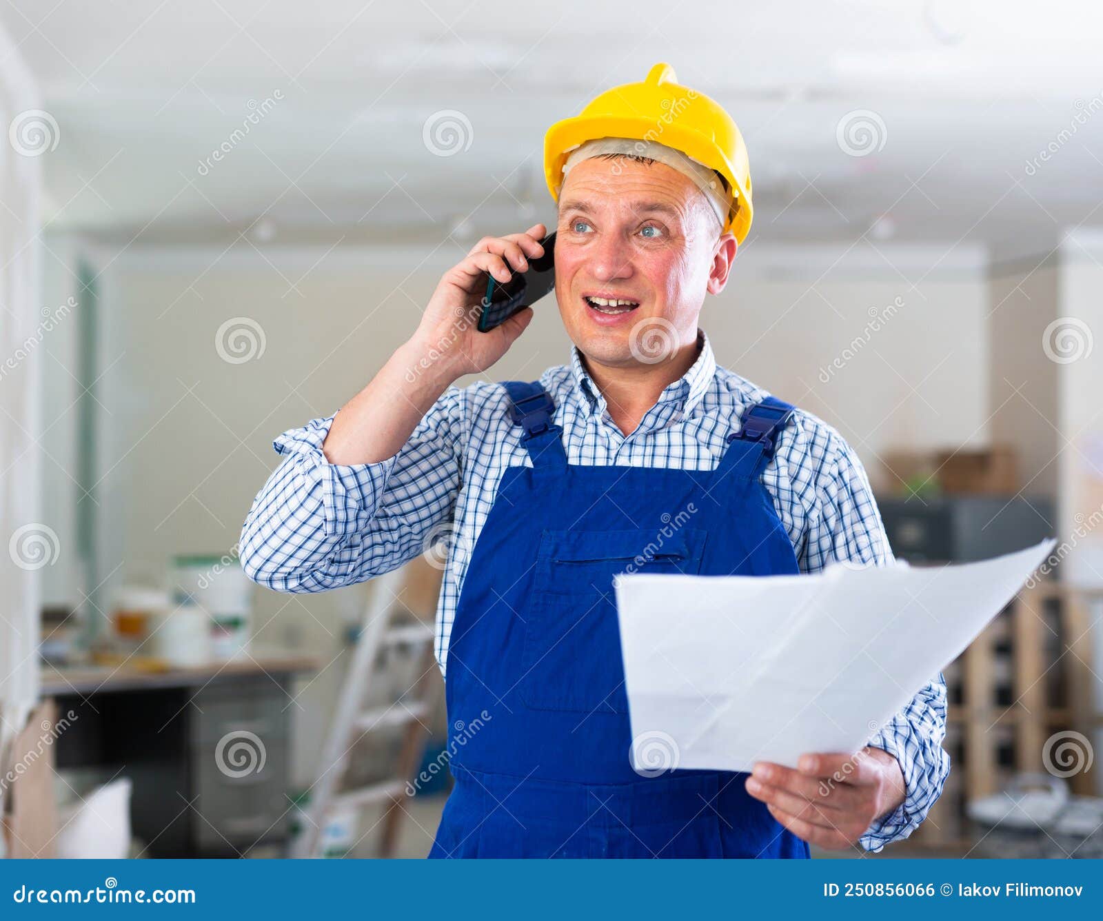 Construction Worker Having Telephone Conversation Stock Photo - Image ...