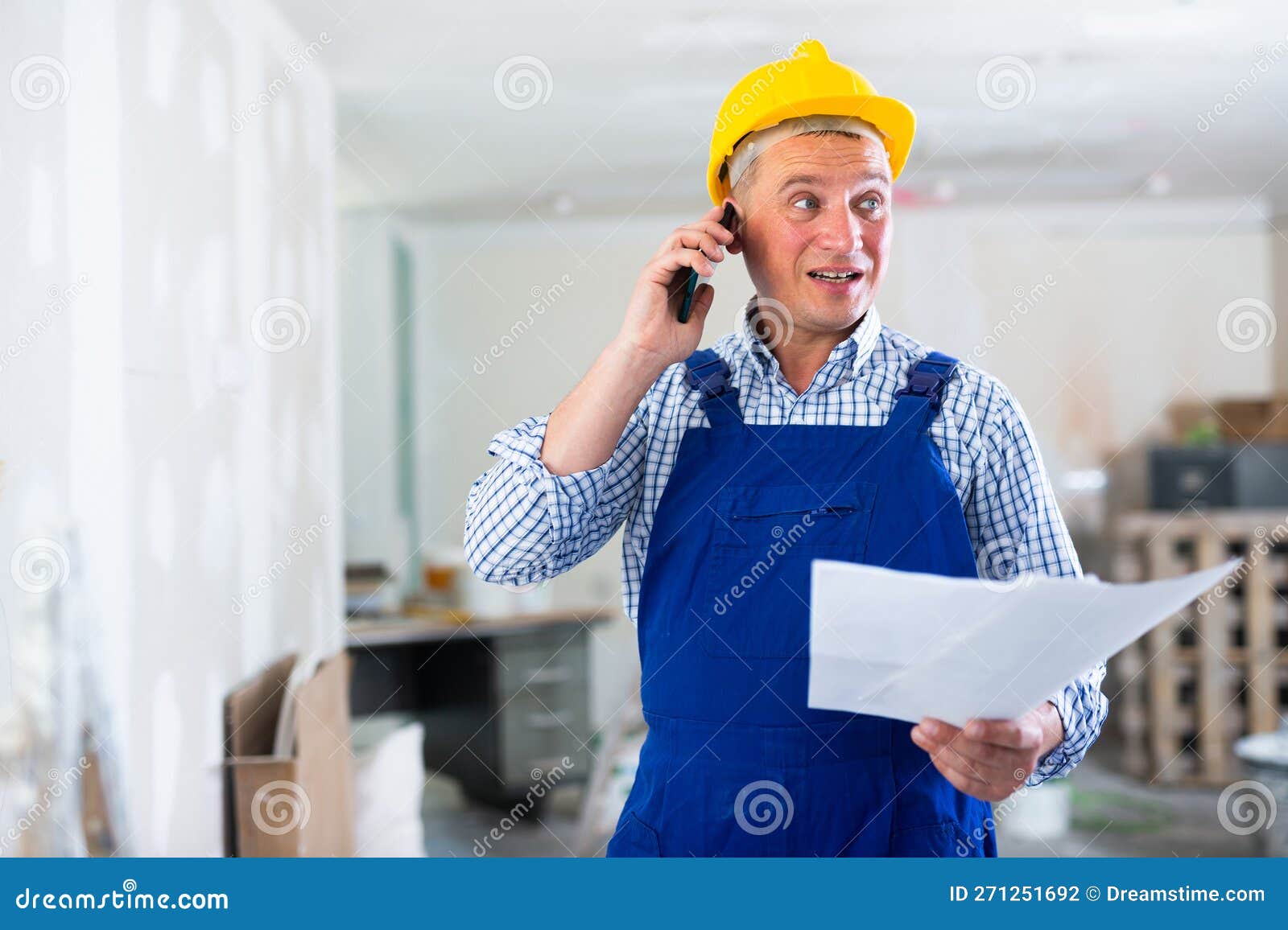 Construction Worker Having Telephone Conversation Stock Photo - Image ...