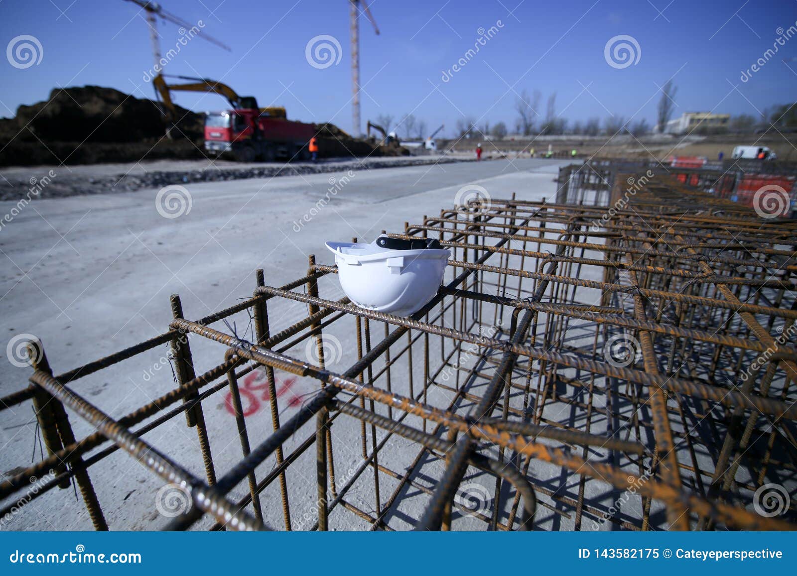 Construction Worker Helmet on Top of a Reinforcing Iron Stock Image ...