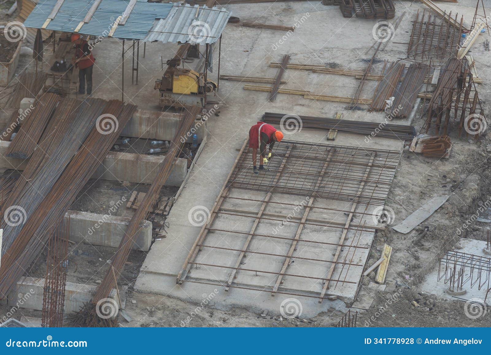 Construction Worker in High Visibility Clothing Operating Tower Crane ...