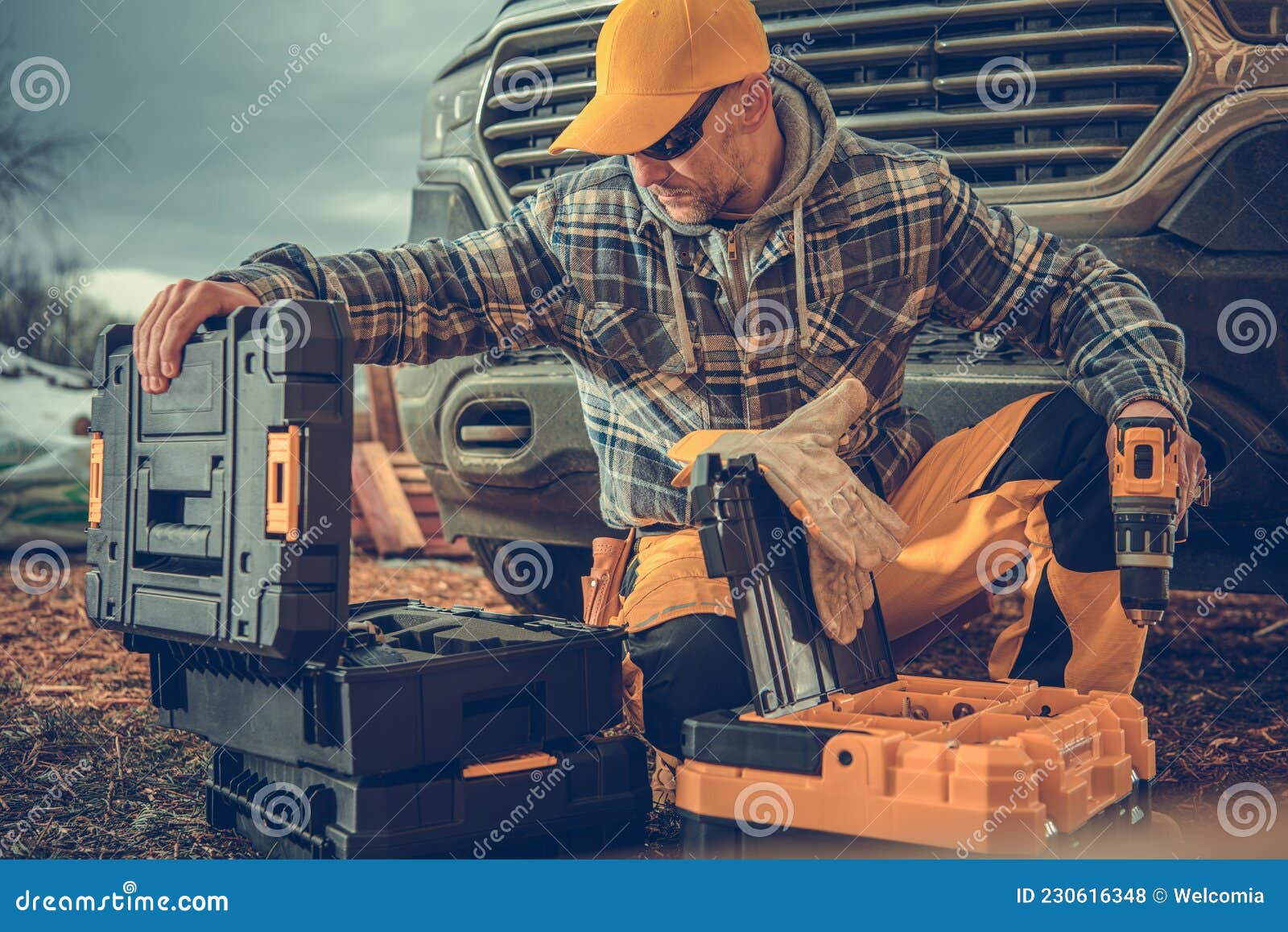 Construction Worker and His Tools Boxes Stock Photo - Image of male ...