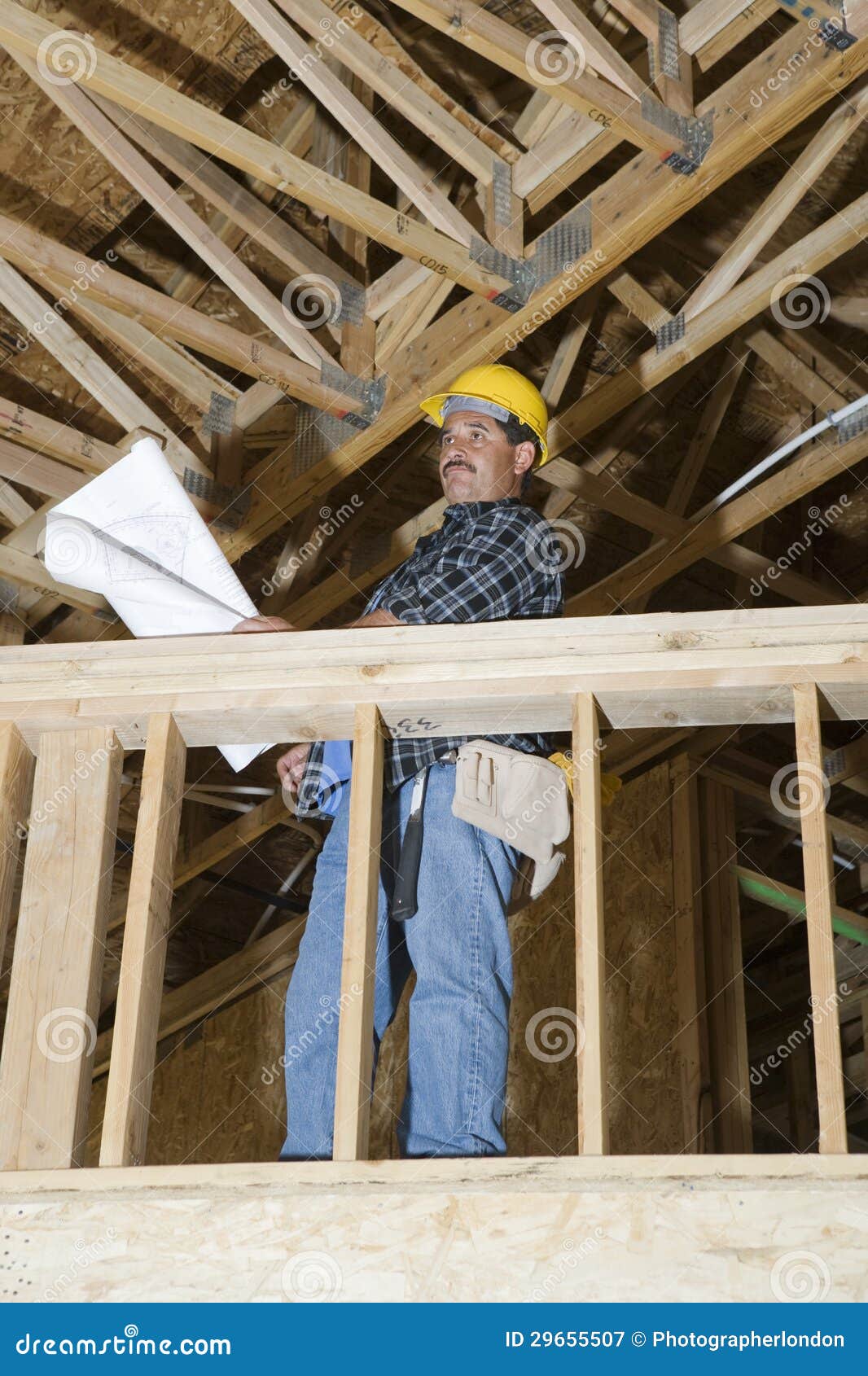 Construction Worker Holding Blueprint Stock Image - Image of occupation ...