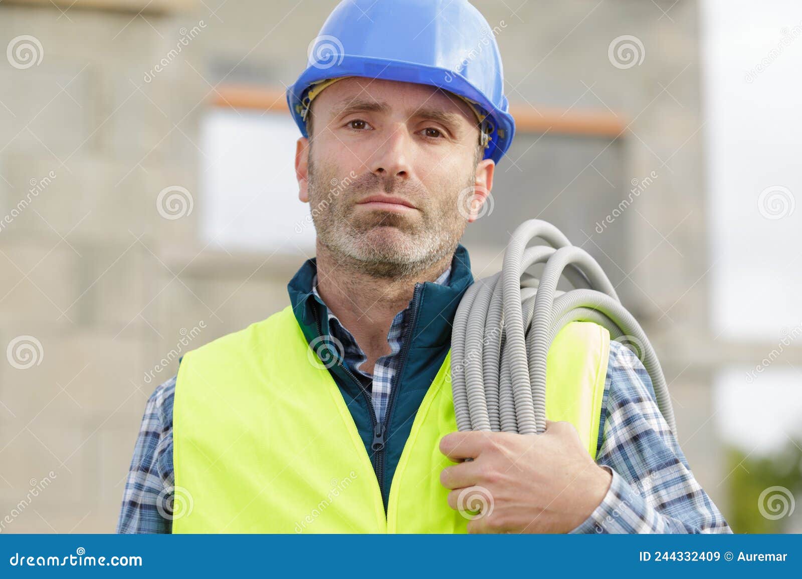 Construction Worker Holding Cables Outdoors Stock Image - Image of ...