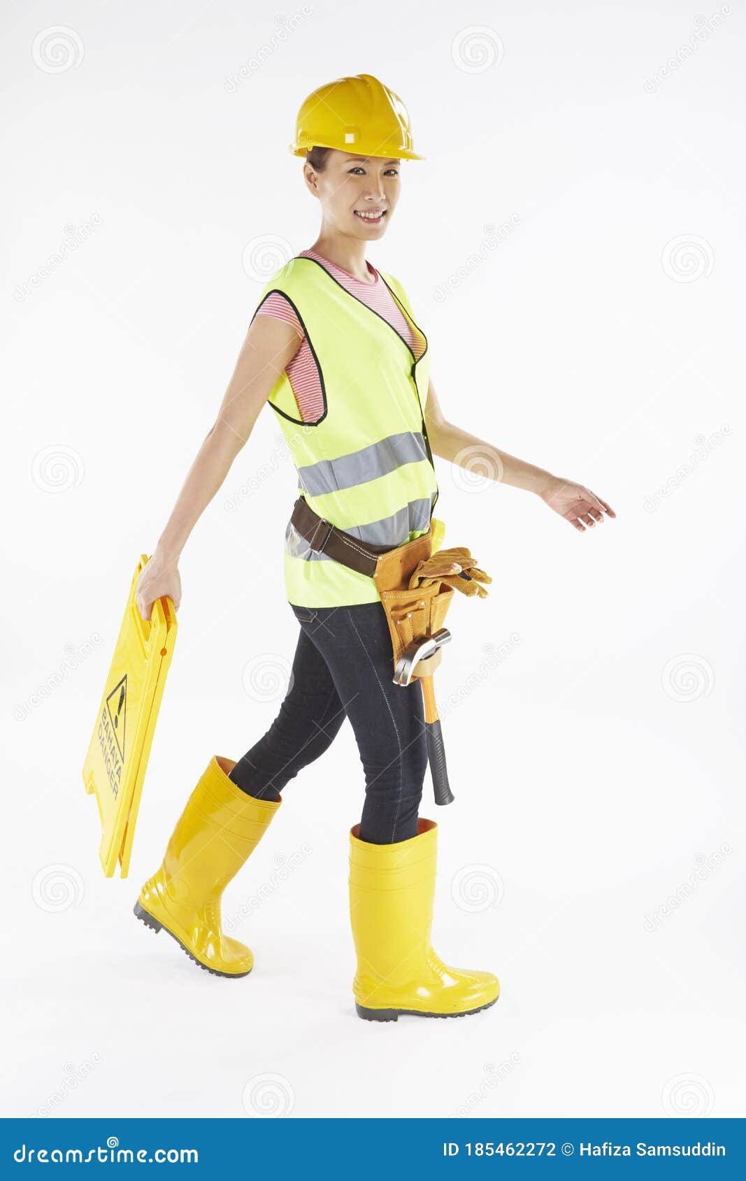 Construction Worker Holding a Danger Sign Stock Photo - Image of belt ... Construction Worker Holding a Danger Sign Stock Photo - Image of belt ...