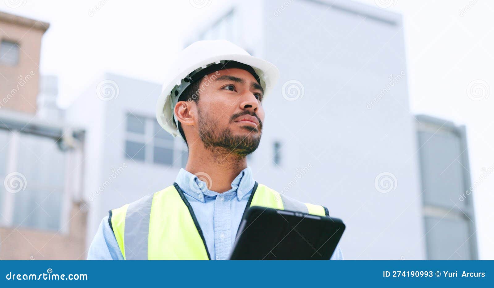 Construction Worker Holding a Digital Tablet while Doing Inspection ...