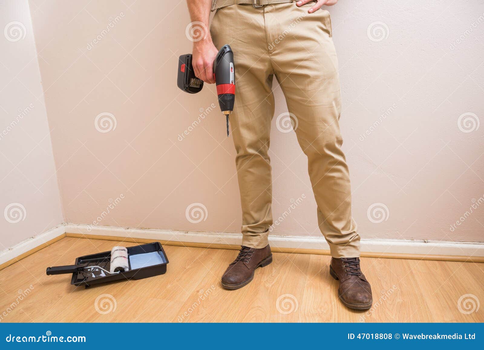 Construction Worker Holding Power Tool Stock Photo - Image of workwear ...