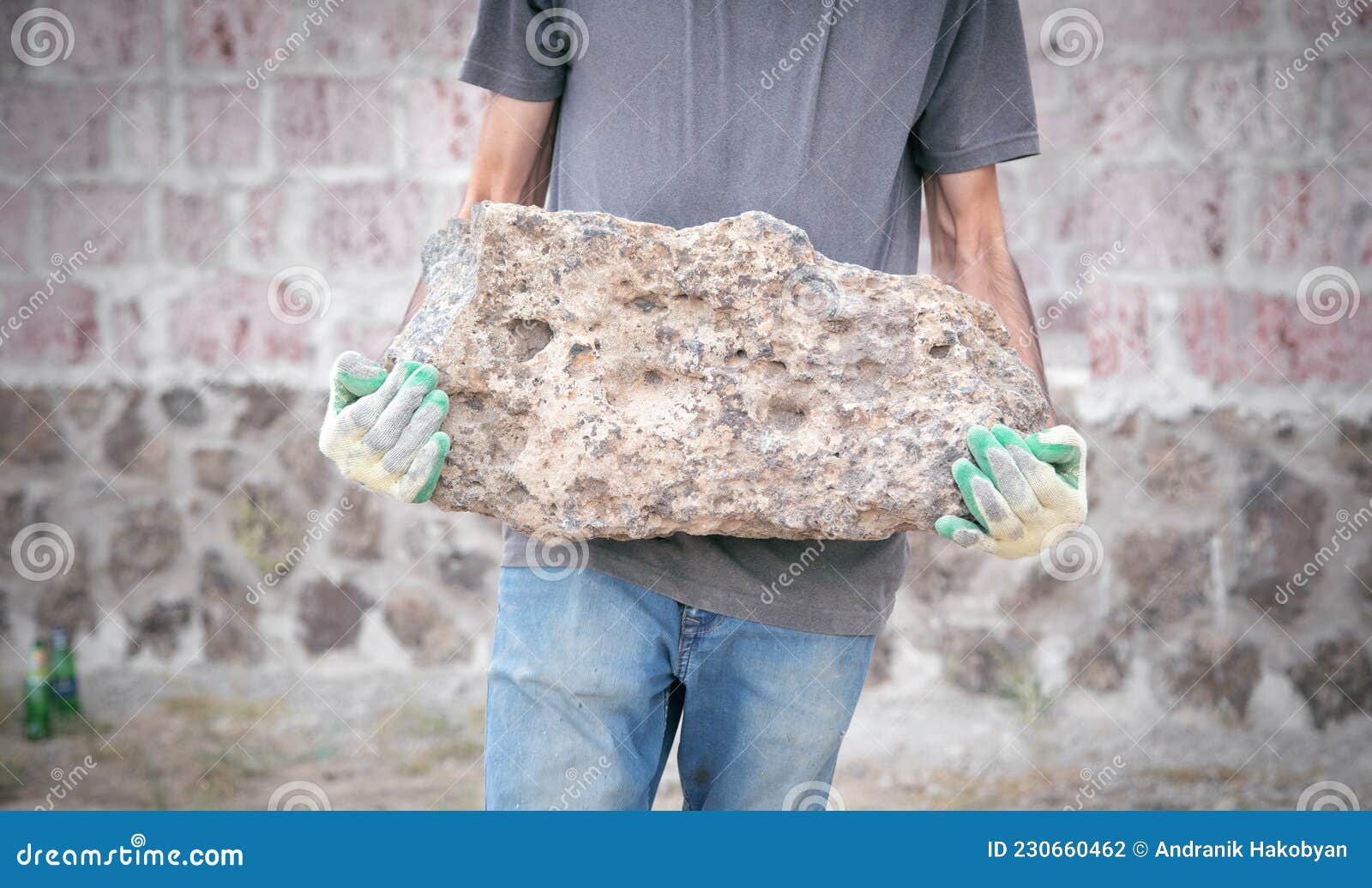 Construction Worker Holding a Quartz Stone Stock Photo - Image of ...