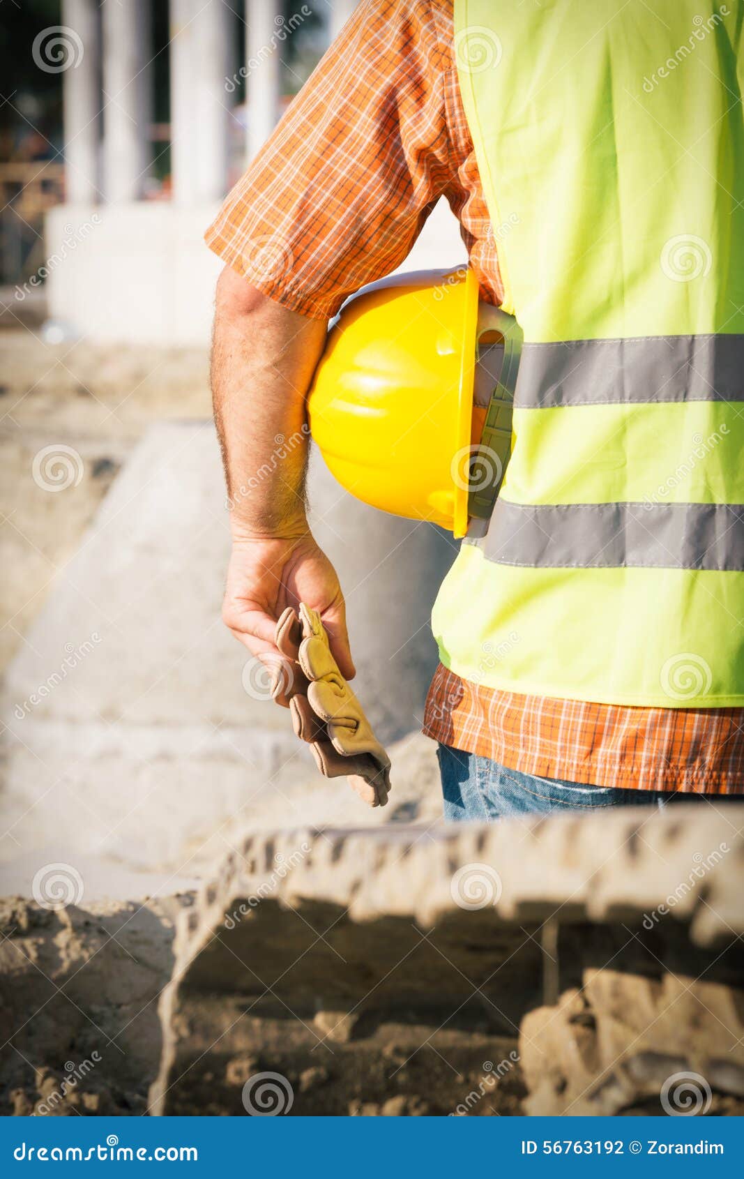 Construction Worker Holding Yellow Hardhat Stock Photo - Image of ...
