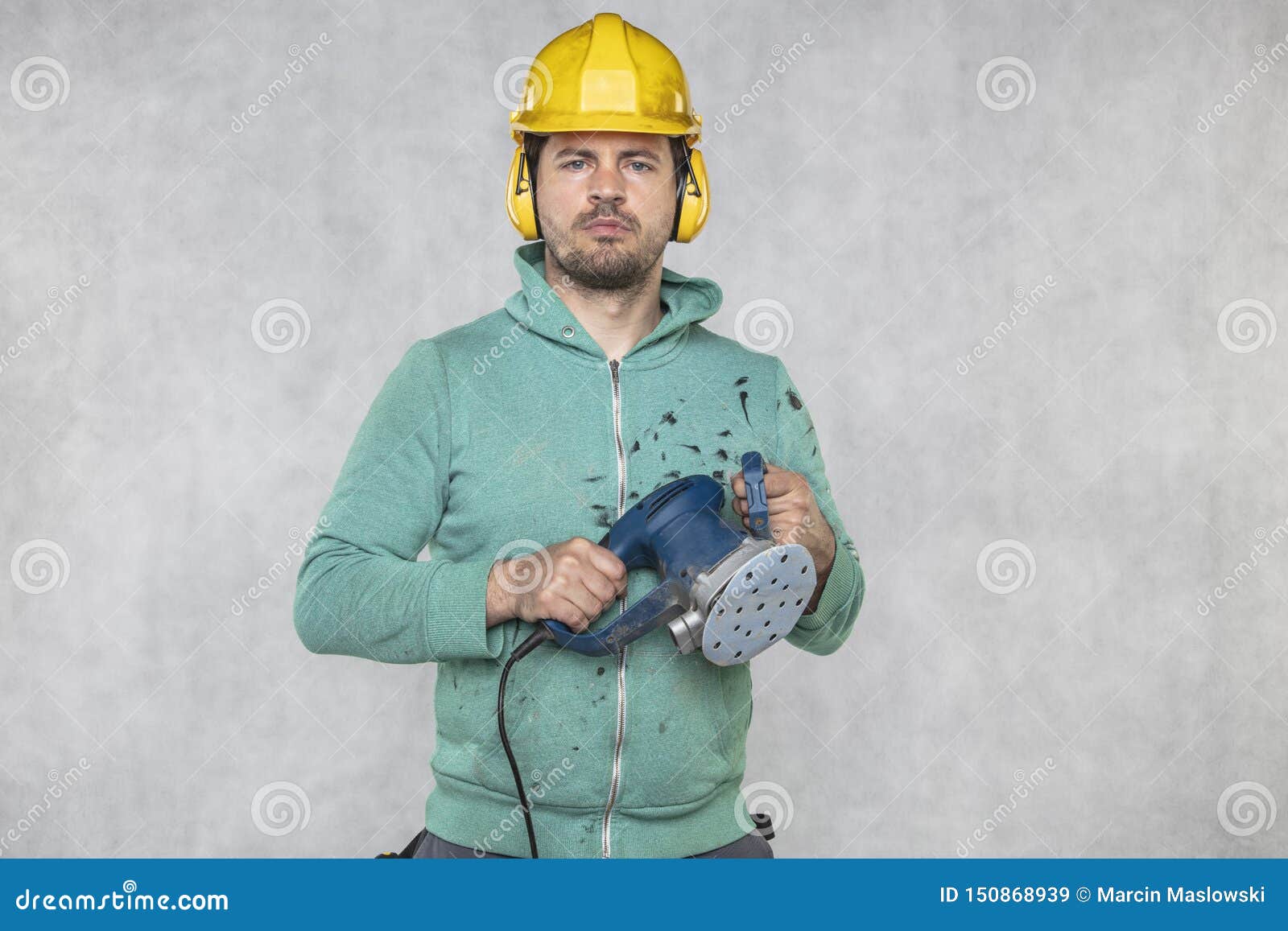 The Construction Worker Holds a New Grinder in His Hand Stock Image ...