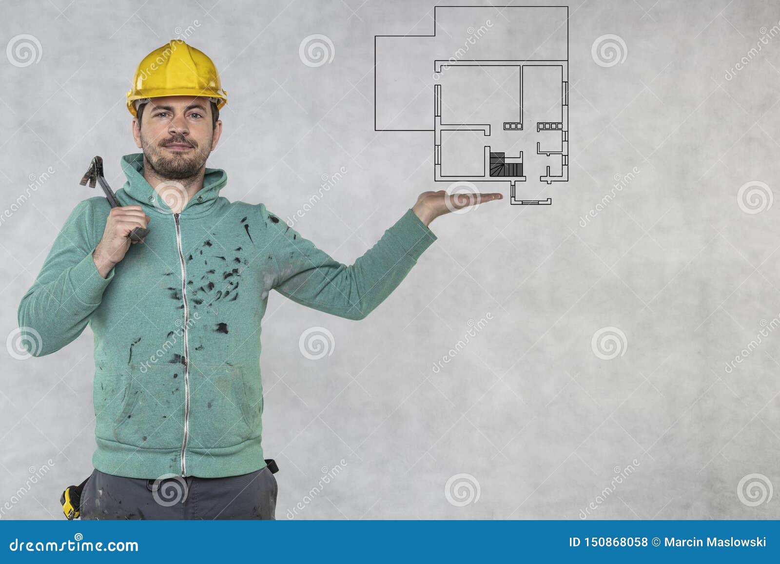 The Construction Worker Holds a Work Tool in His Hands, a Crowbar ...