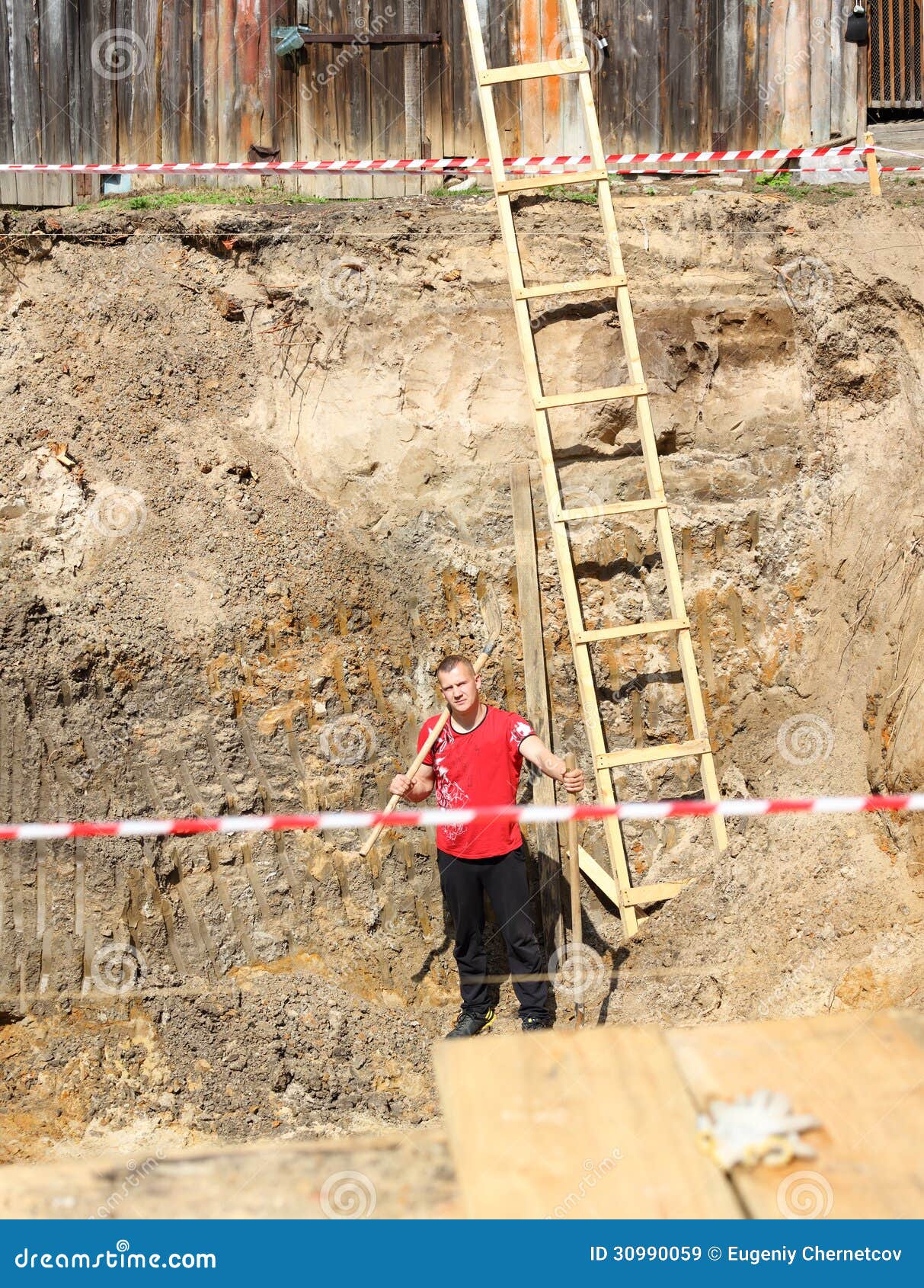 Construction Worker in a Hole Stock Image - Image of building, shovel ...