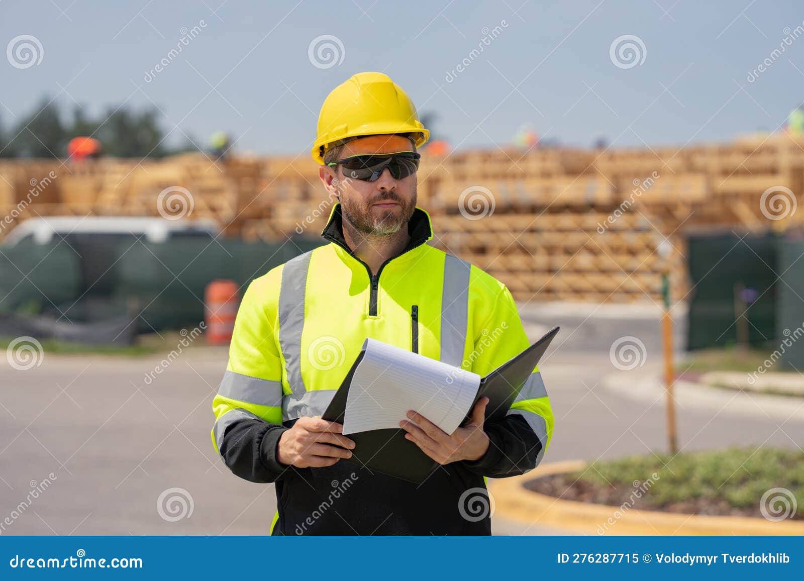 Construction Worker at House Under Construction. Male Builder ...