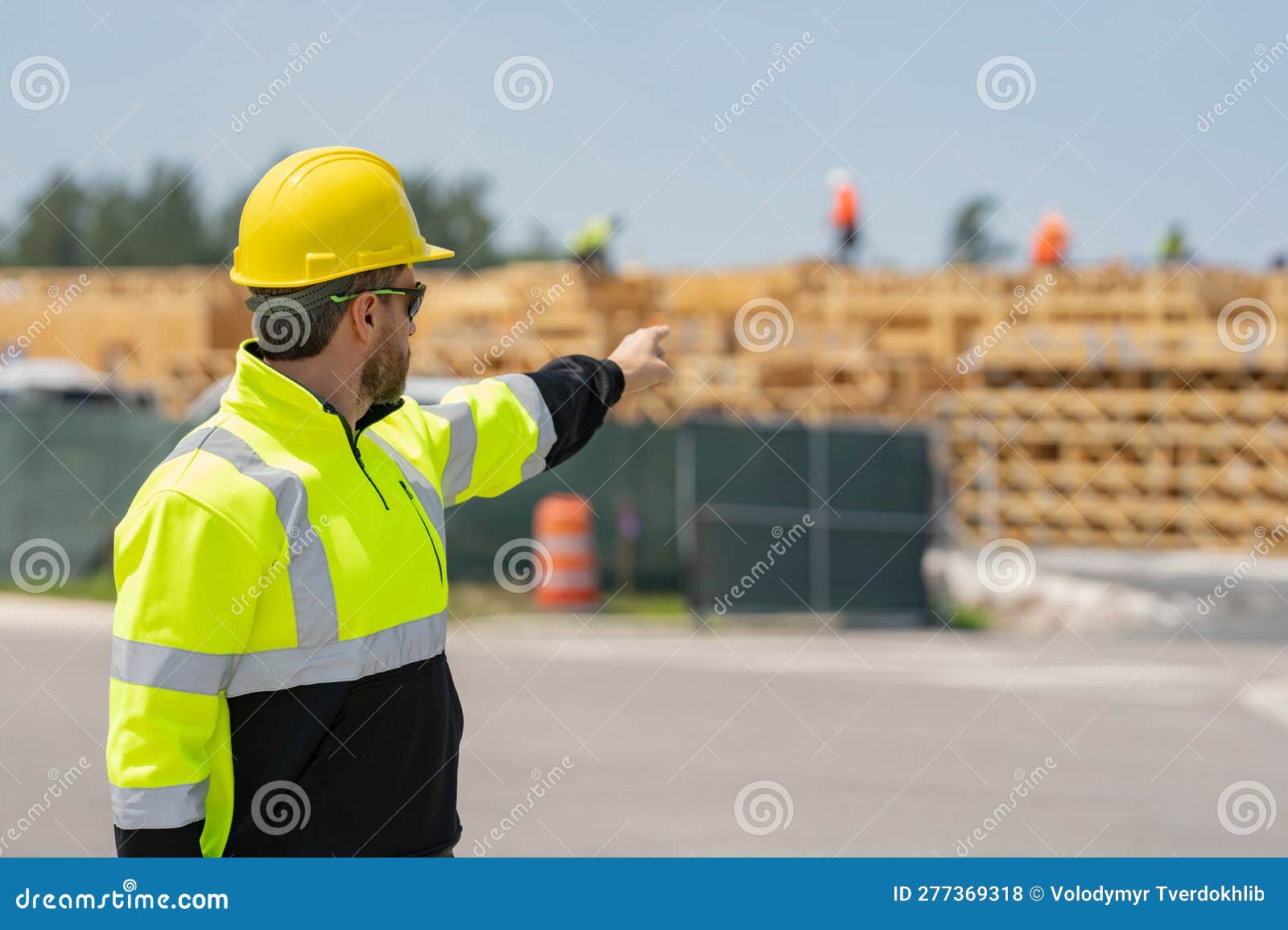 Construction Worker at House Under Construction. Male Builder ...