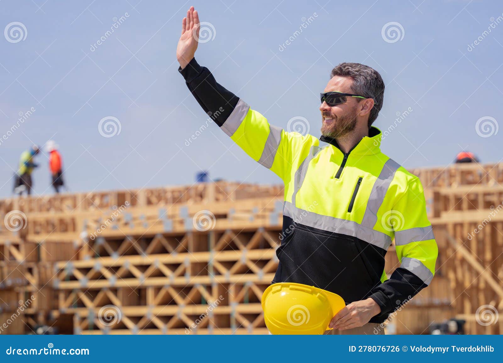 Construction Worker at House Under Construction. Male Builder ...