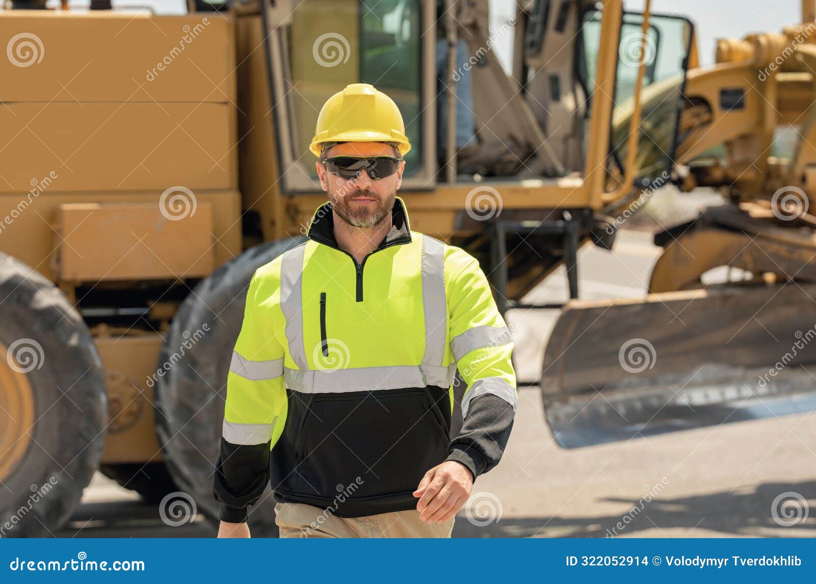Construction Worker at House Under Construction. Male Builder ...