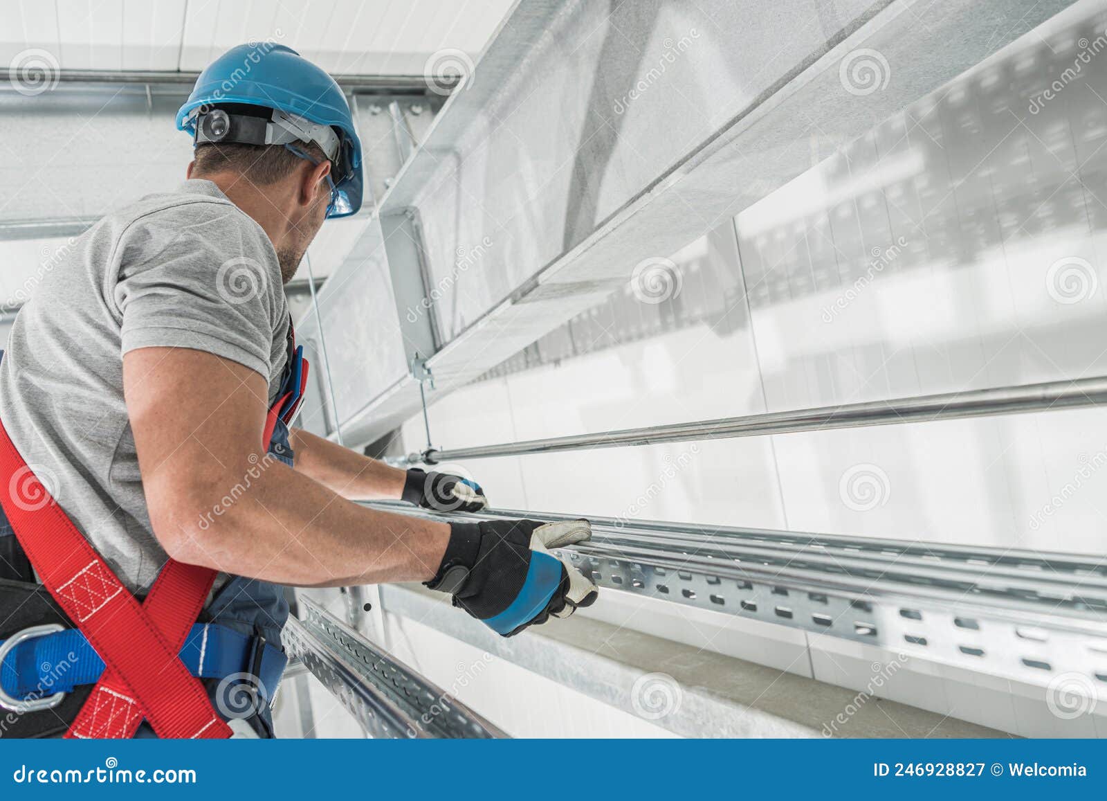 Construction Worker Inside a Warehouse Building Preparing Aluminium ...