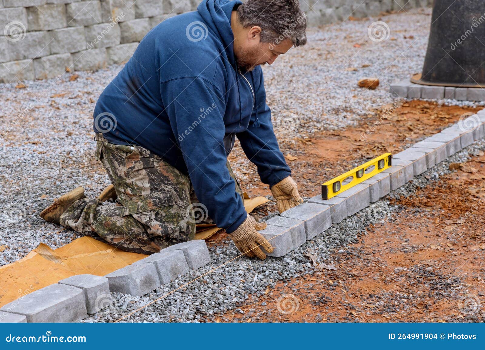 Construction Worker Installing Arranging Precast Concrete Pavers Stone ...