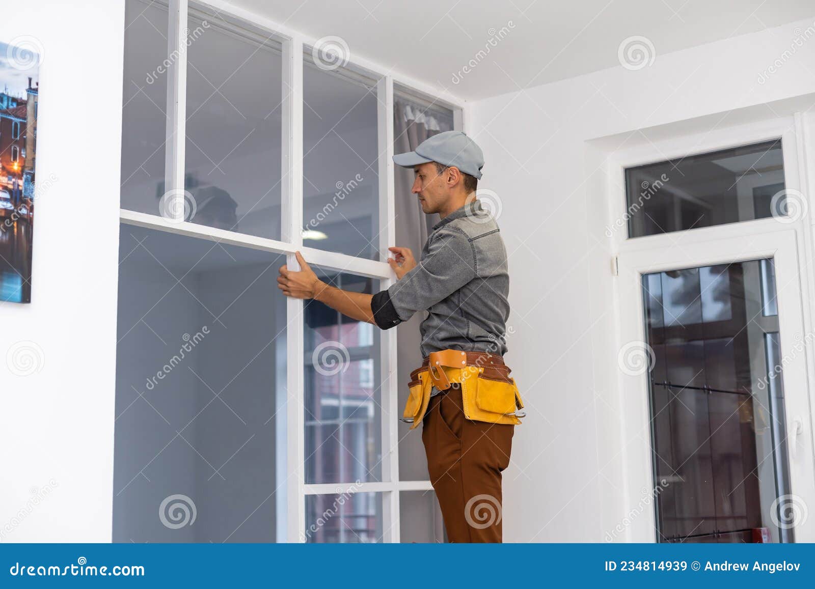 Construction Worker Installing Metal Profile for Interior Partition ...