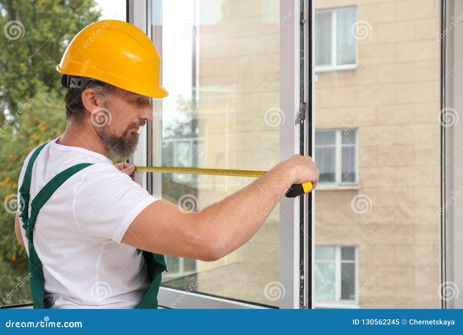 Construction Worker Installing New Window Stock Image - Image of office ...