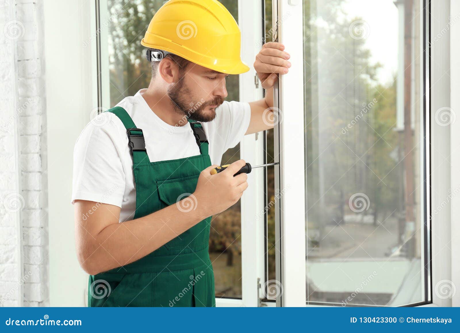 Construction Worker Installing New Window Stock Photo - Image of house ...