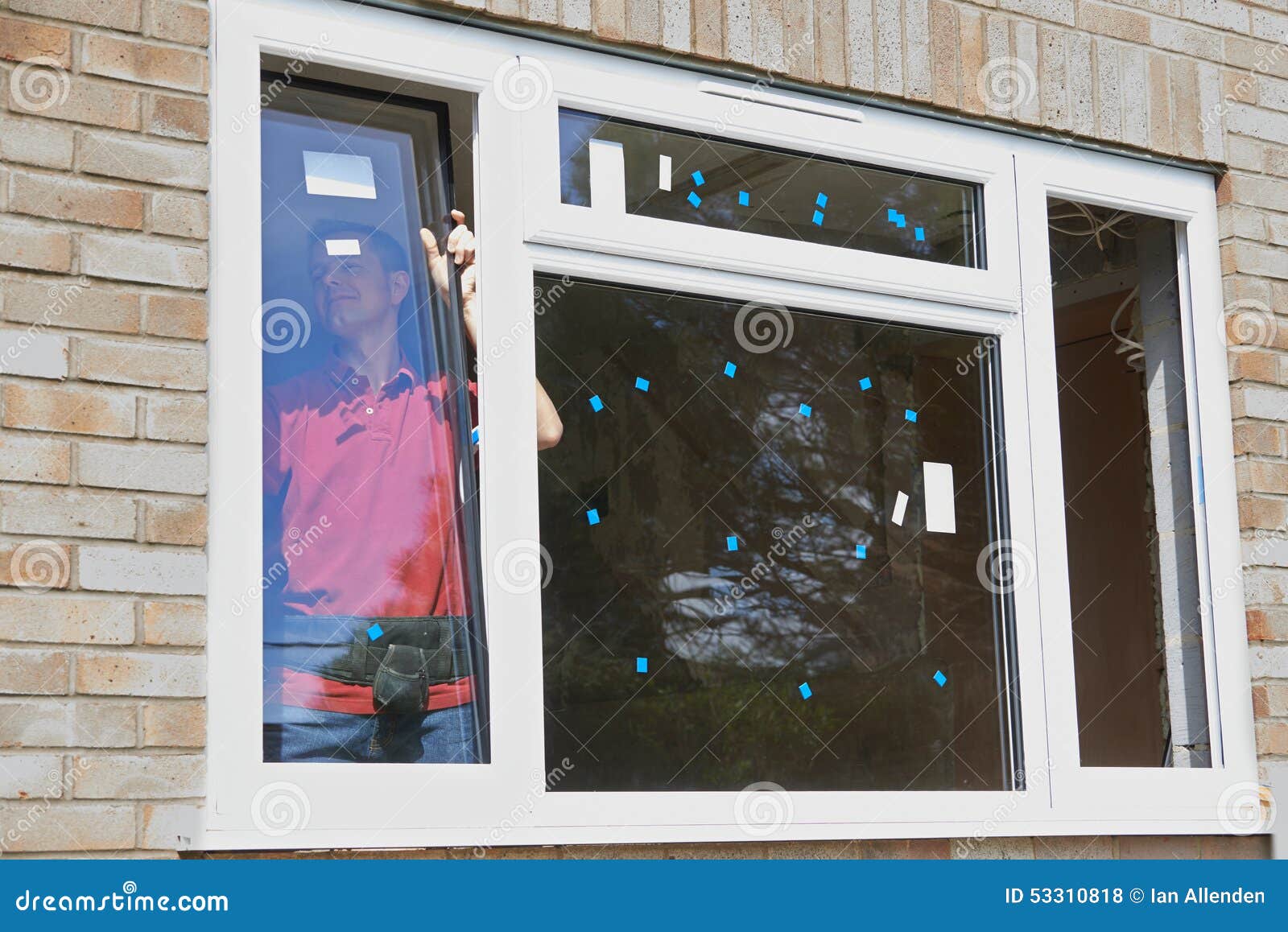 Construction Worker Installing New Windows in House Stock Photo - Image ...