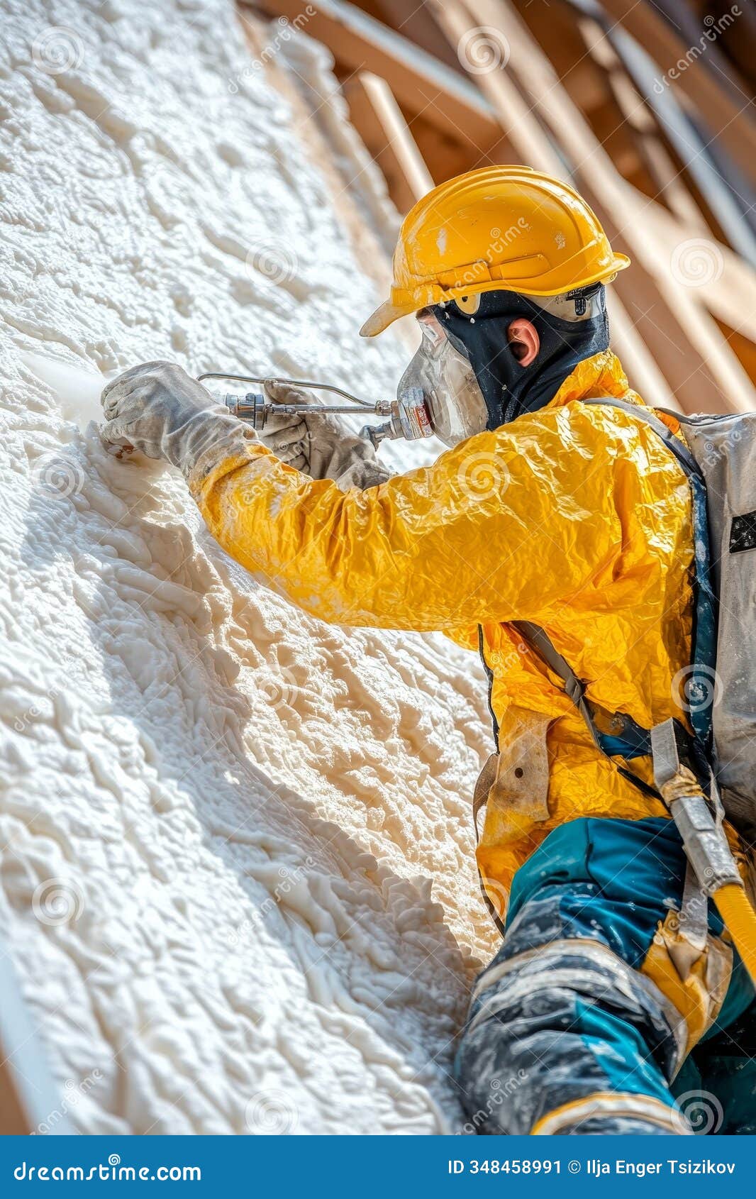 Construction Worker Installing Spray Foam Insulation, Reducing Energy ...