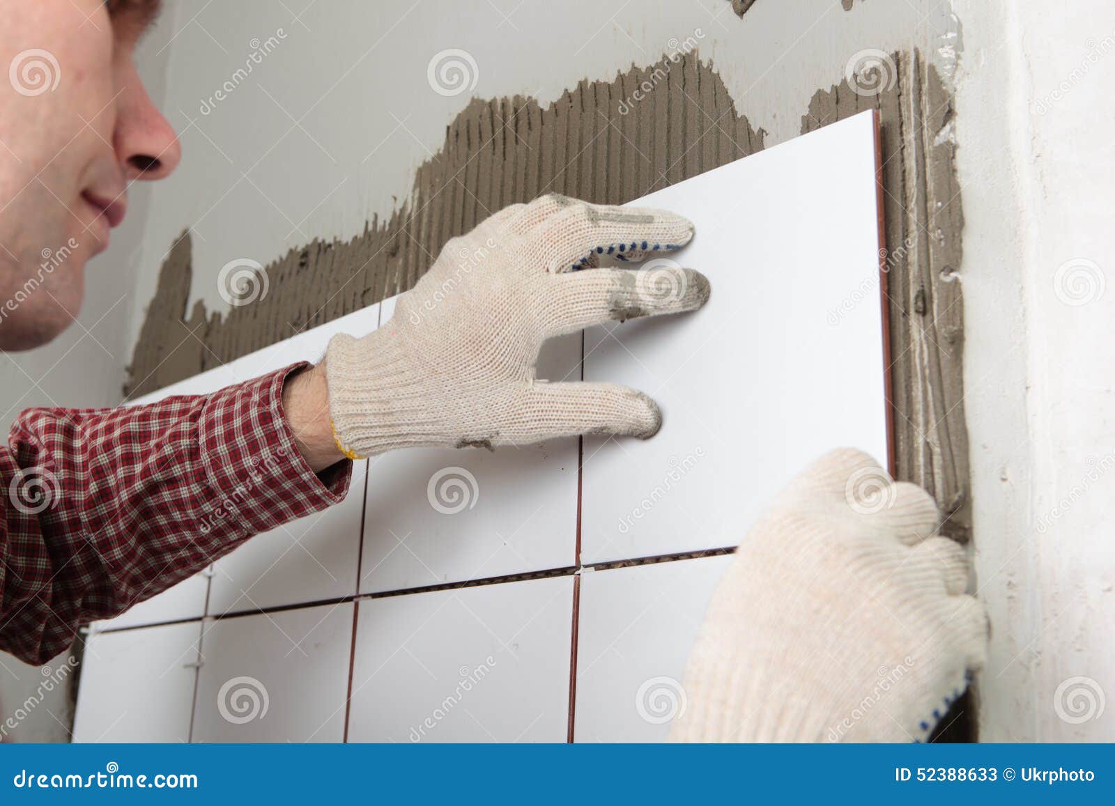 Construction Worker Installing Tiles Stock Image - Image of installing ...